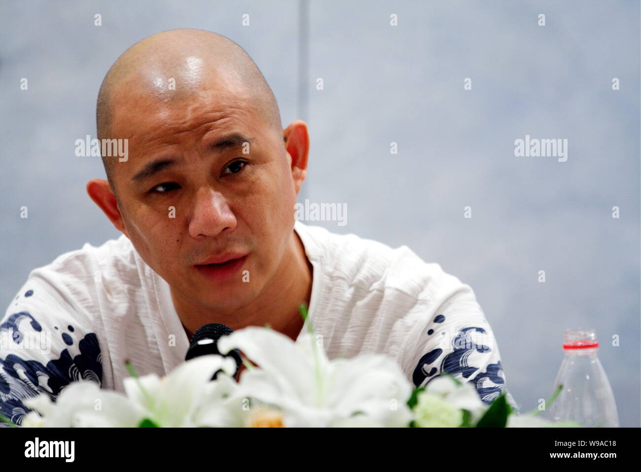 Chinese contemporary artist Fang Lijun speaks at a lecture during his ...