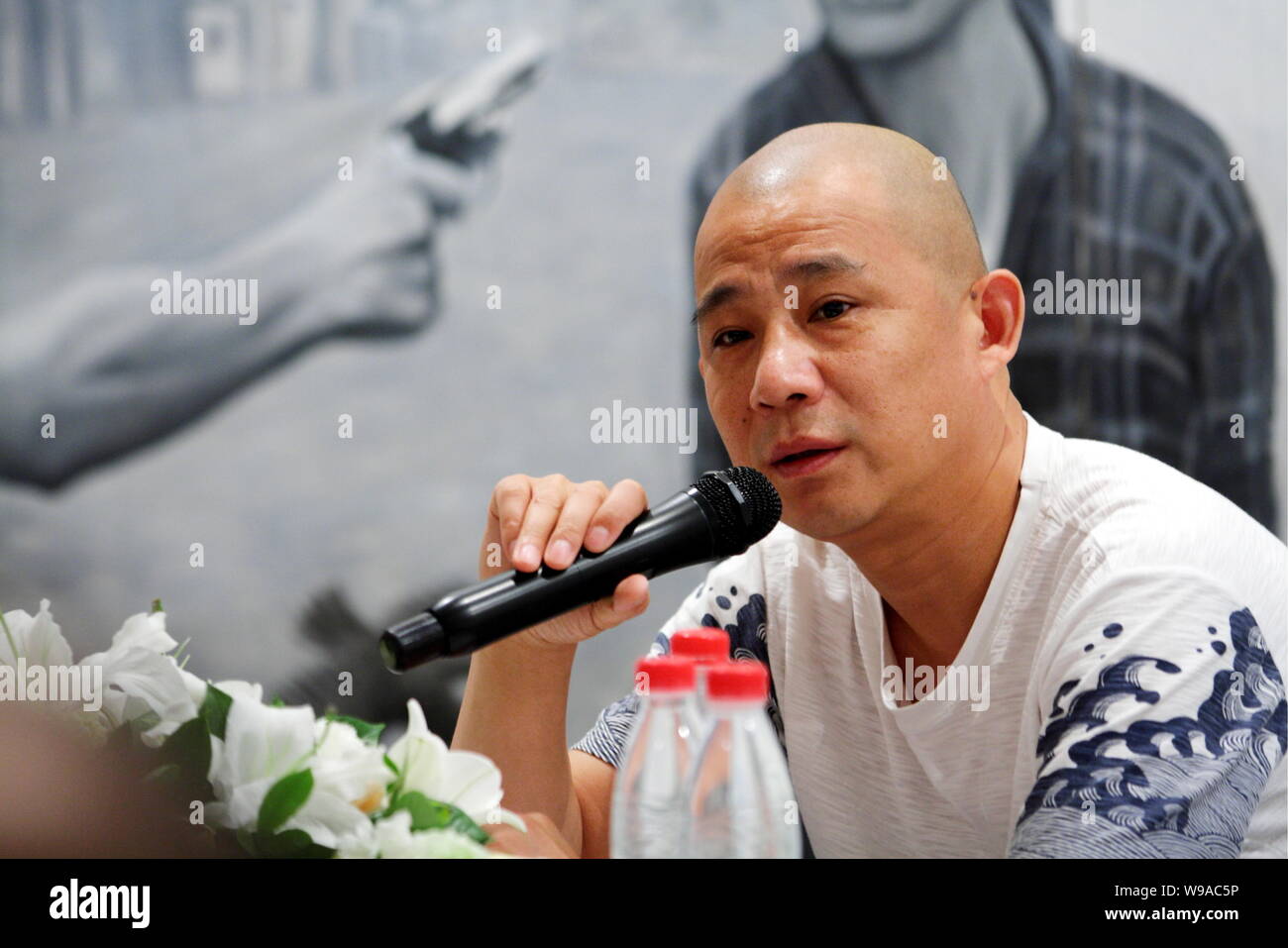 Chinese contemporary artist Fang Lijun speaks at a lecture during his ...