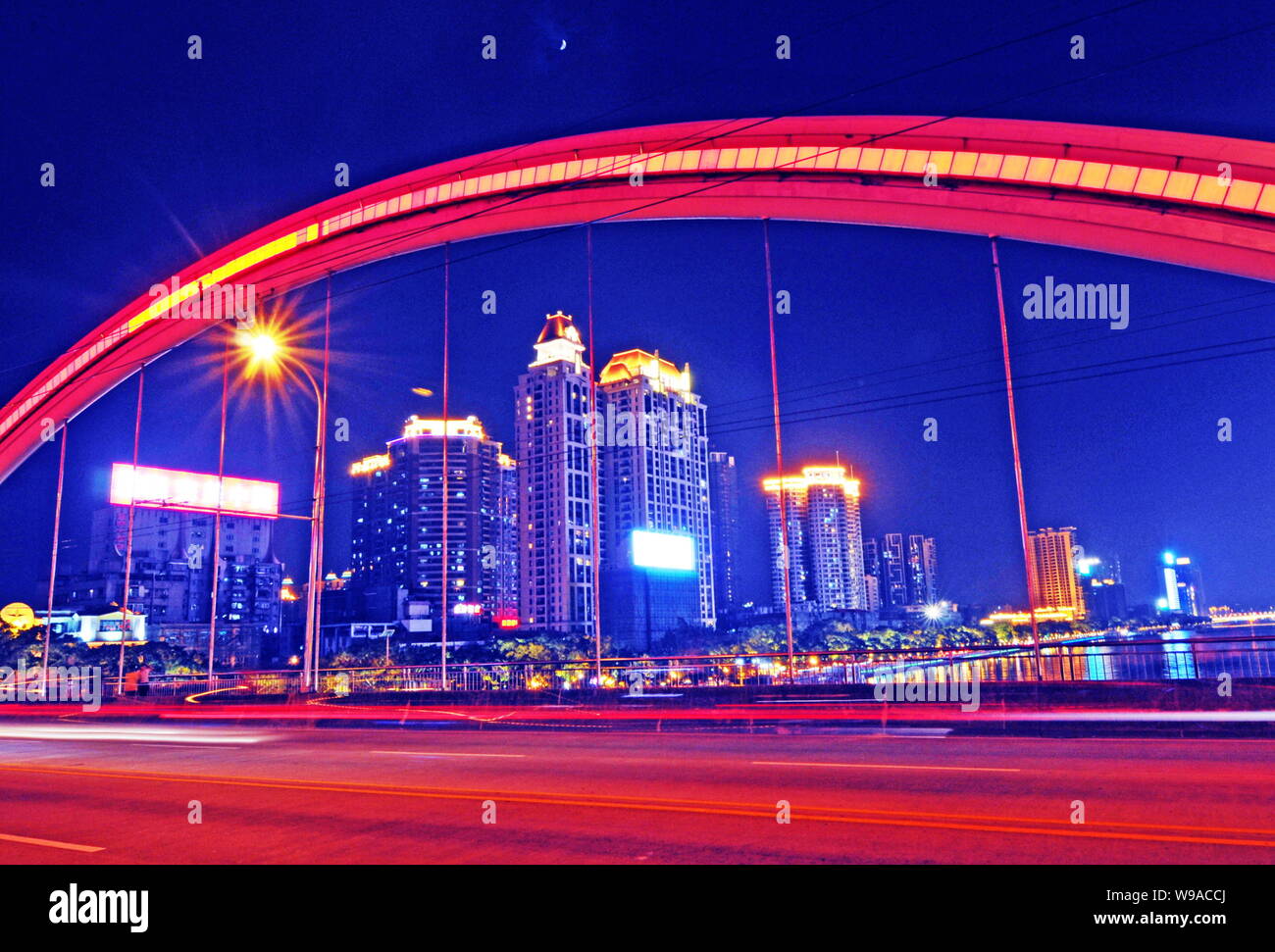 --FILE--Night view of commercial buildings along the Pearl River ...