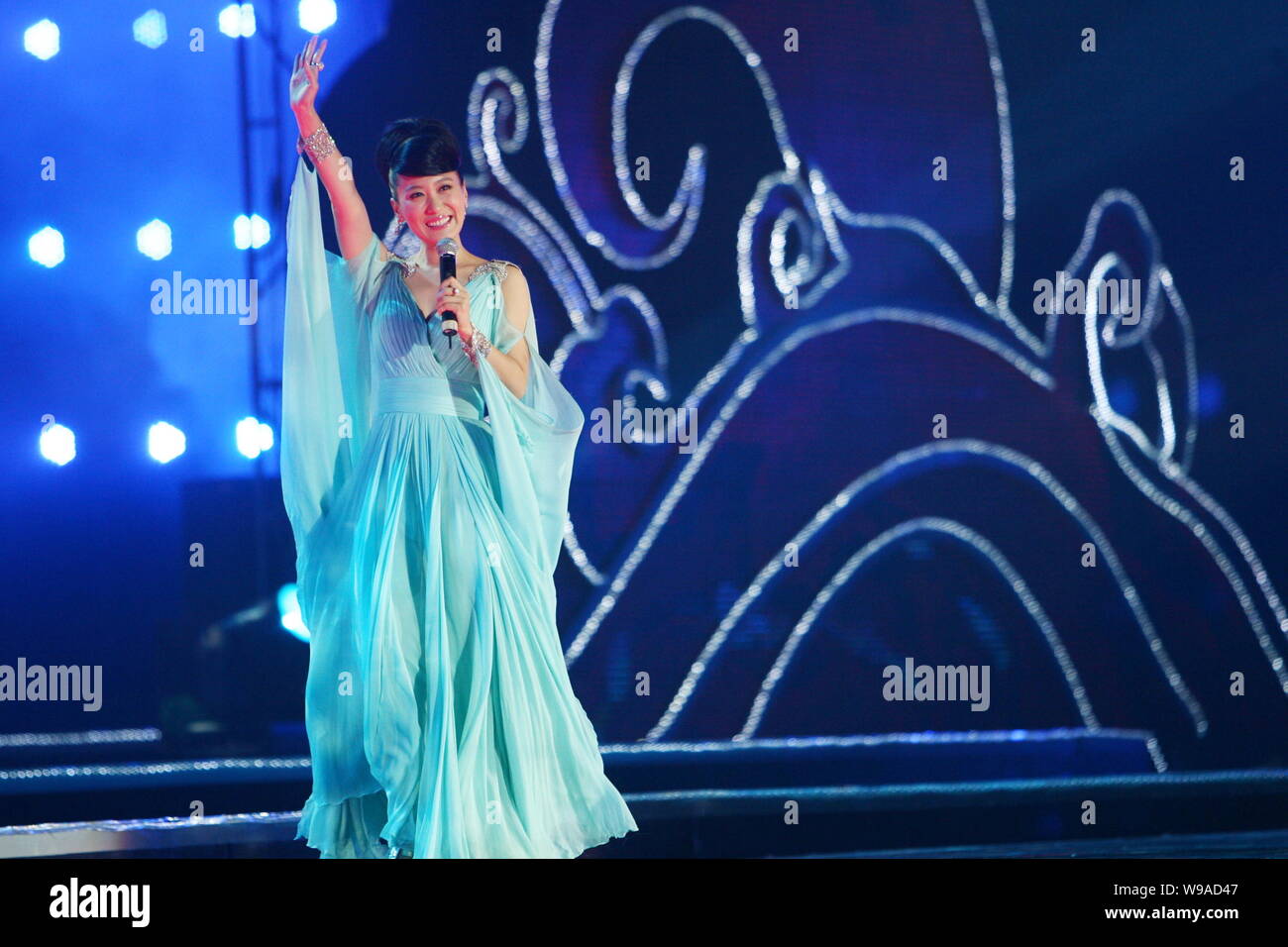 Chinese singer Tan Jing performs at the opening ceremony of the 2nd ...