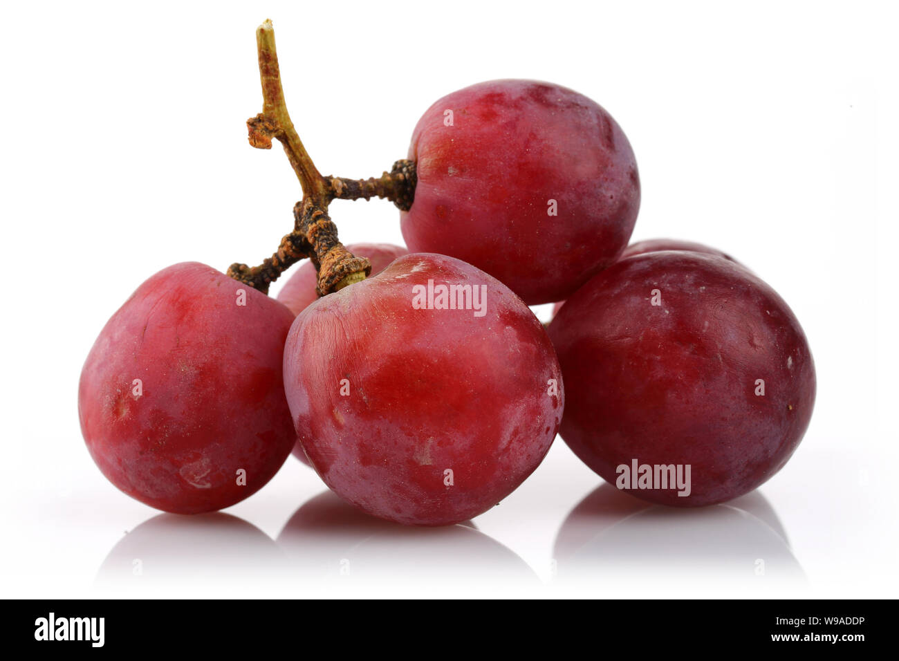 Fresh red grape isolated on white background Stock Photo - Alamy
