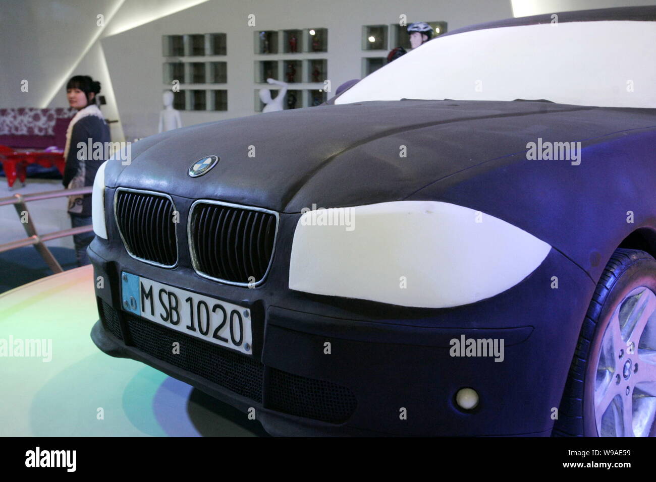 A chocolate-made BMW car is seen on display during a preview of the ...