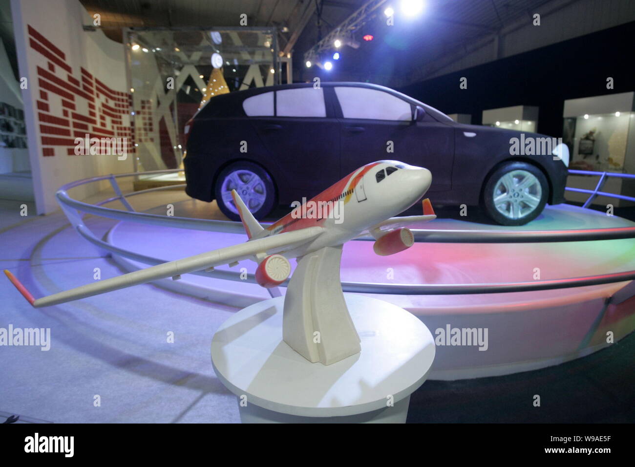 A chocolate-made BMW car and a chocolate-made model plane are seen on ...