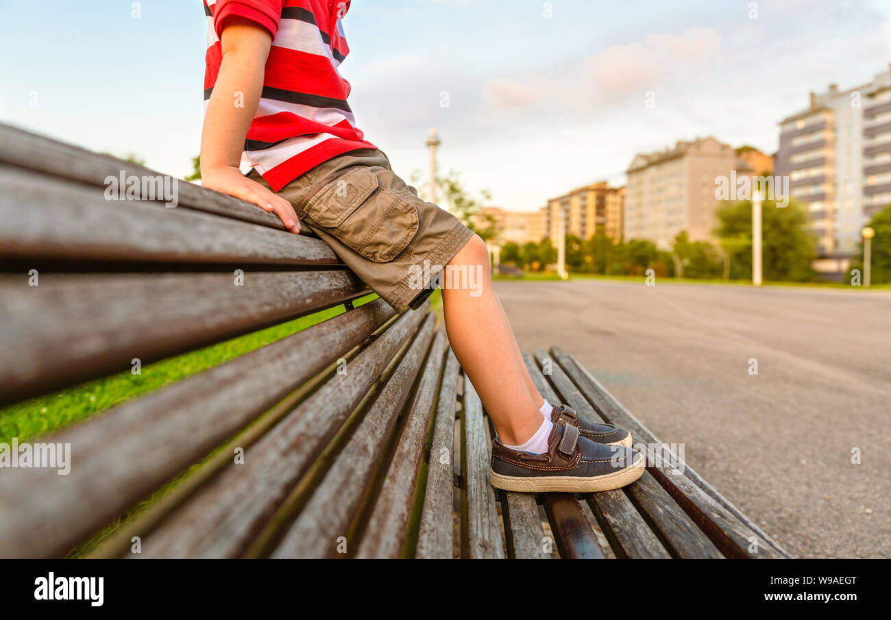 Legs on bench hi-res stock photography and images - Alamy