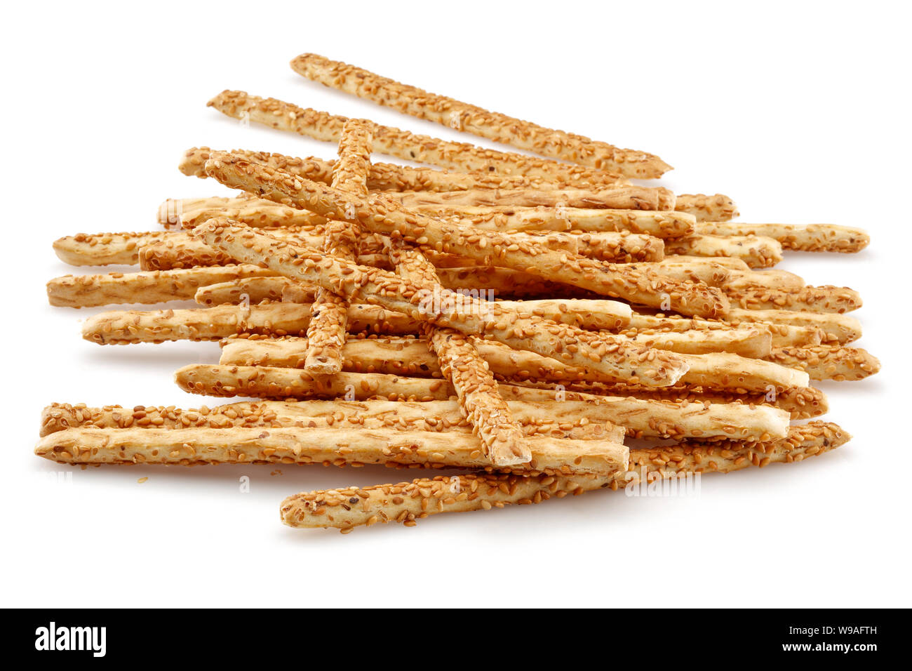 Sesame stick crackers or grissini isolated on white background Stock ...