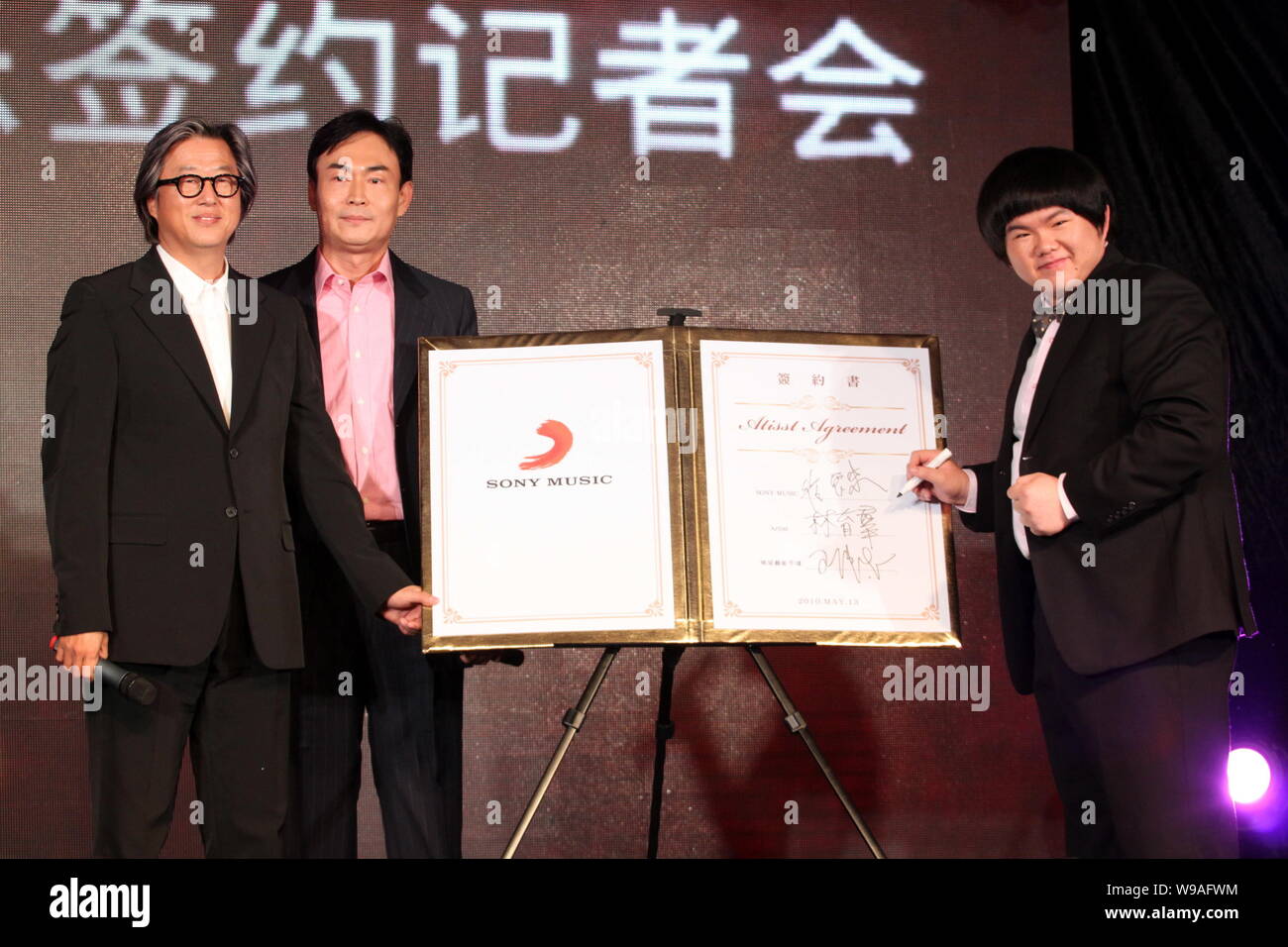 Lin Yu Chun, right, known as Taiwans Susan Boyle, stands next to Adam ...