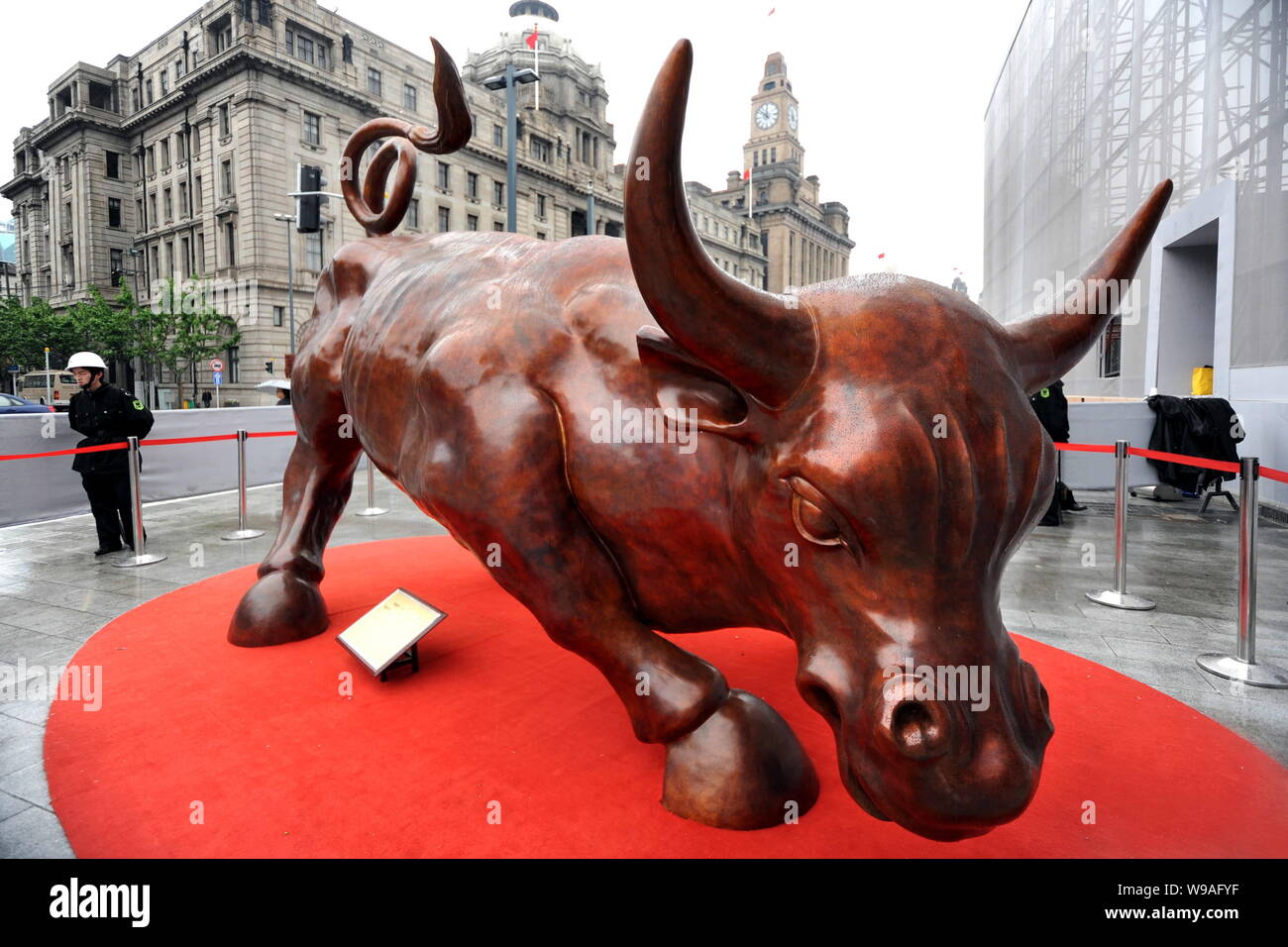 The bronze Bund Bull statue, designed by Italian-American artist Arturo ...