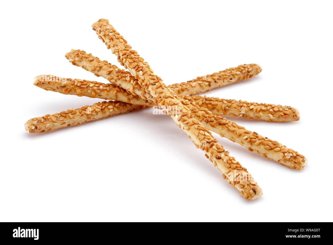 Sesame stick crackers or grissini isolated on white background Stock ...