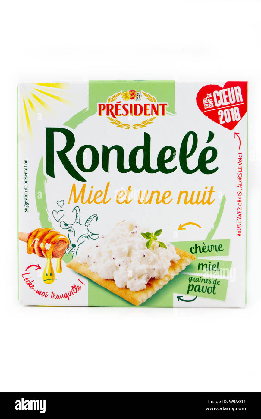 round cheese on a white background Stock Photo - Alamy