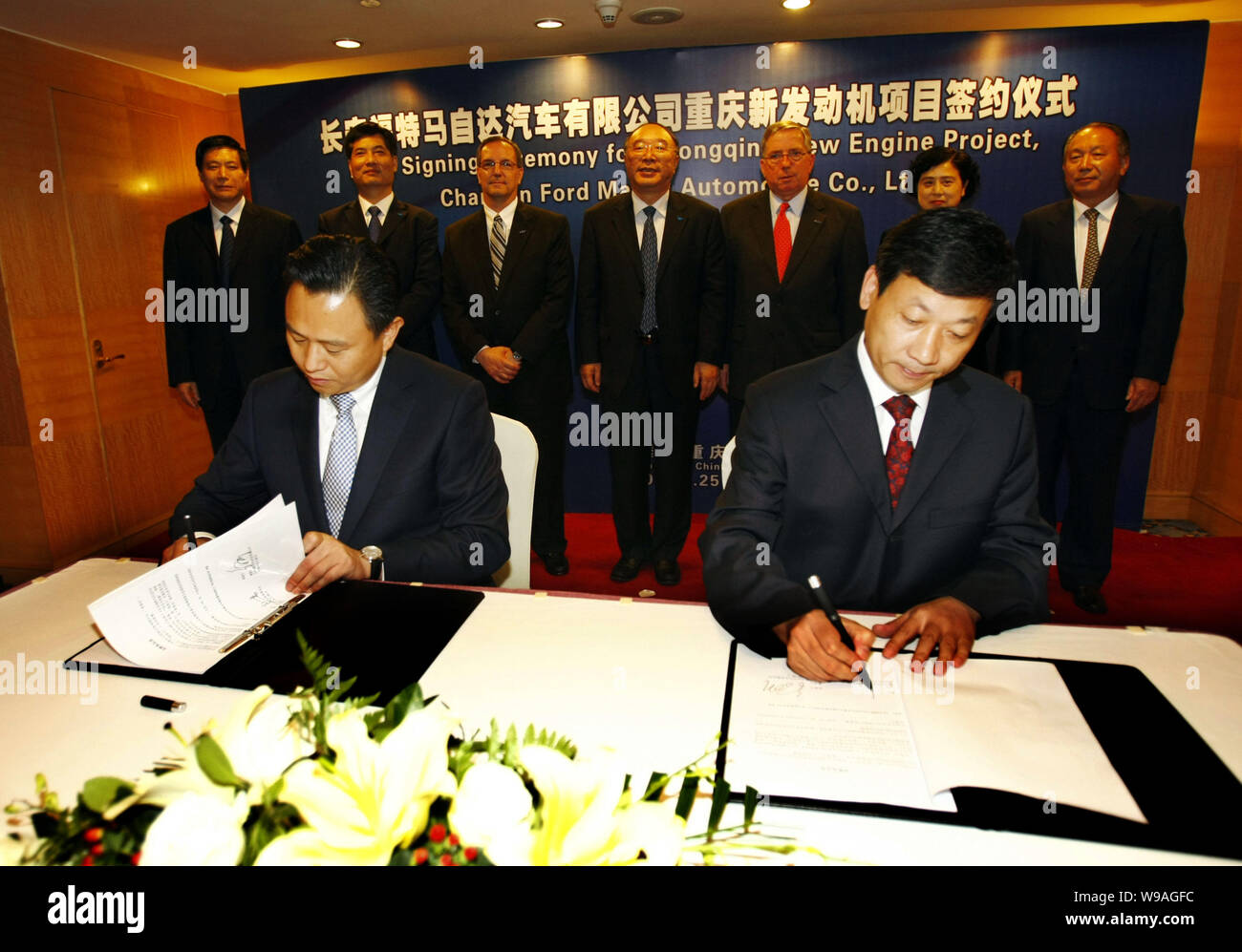 Xu Liuping, left, Chairman and President of Changan Automobile Group ...