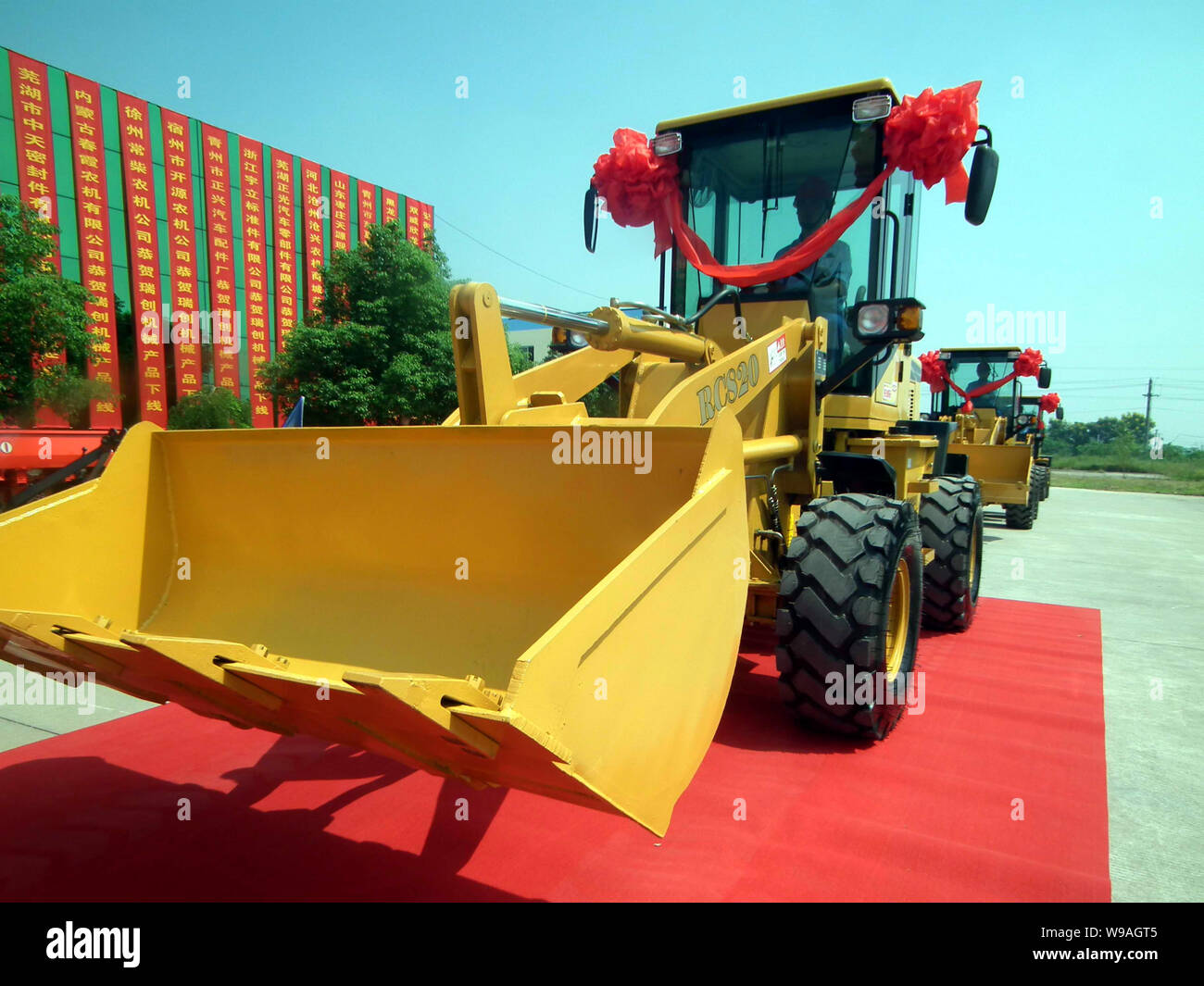 Wheel loaders are seen at a roll-out ceremony at the plant of Rekon ...