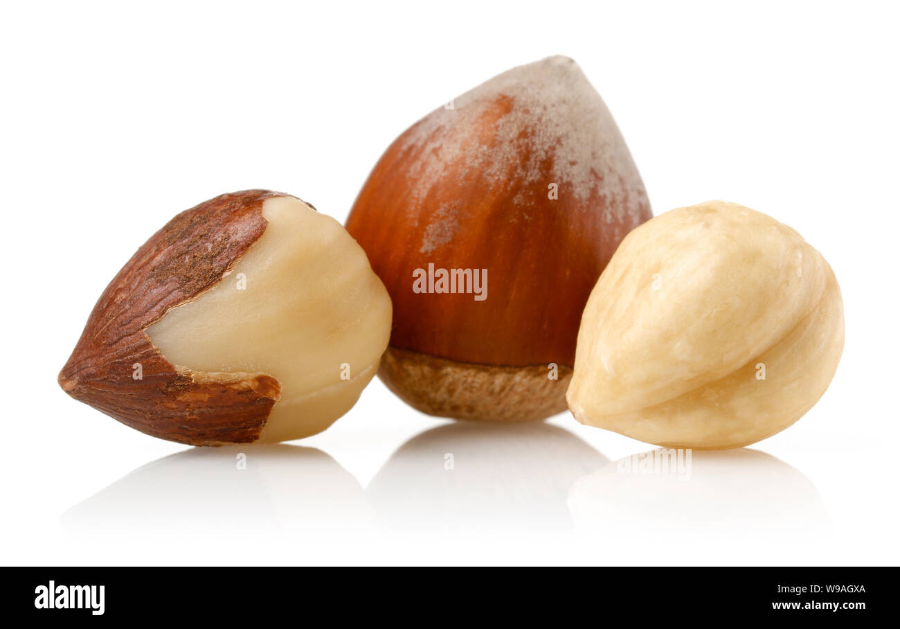 Group of hazelnuts isolated on white background Stock Photo - Alamy
