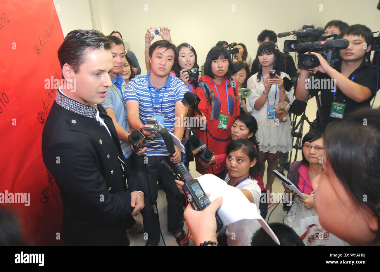 Russian singer Vitas answers questions at a press conference before the ...