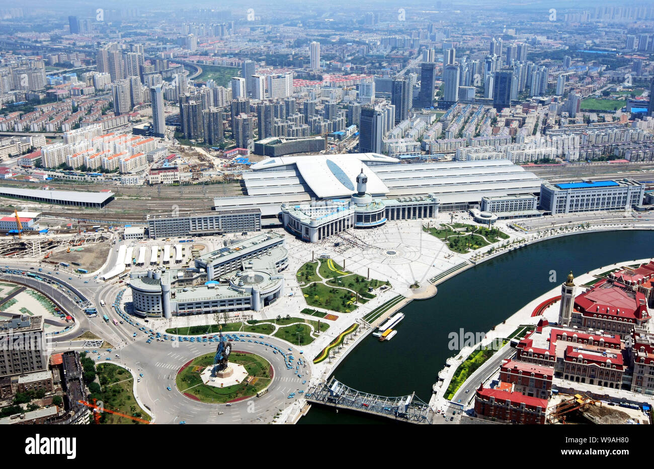 --FILE--Aerial view of the Tianjin Railway Station and clusters of ...