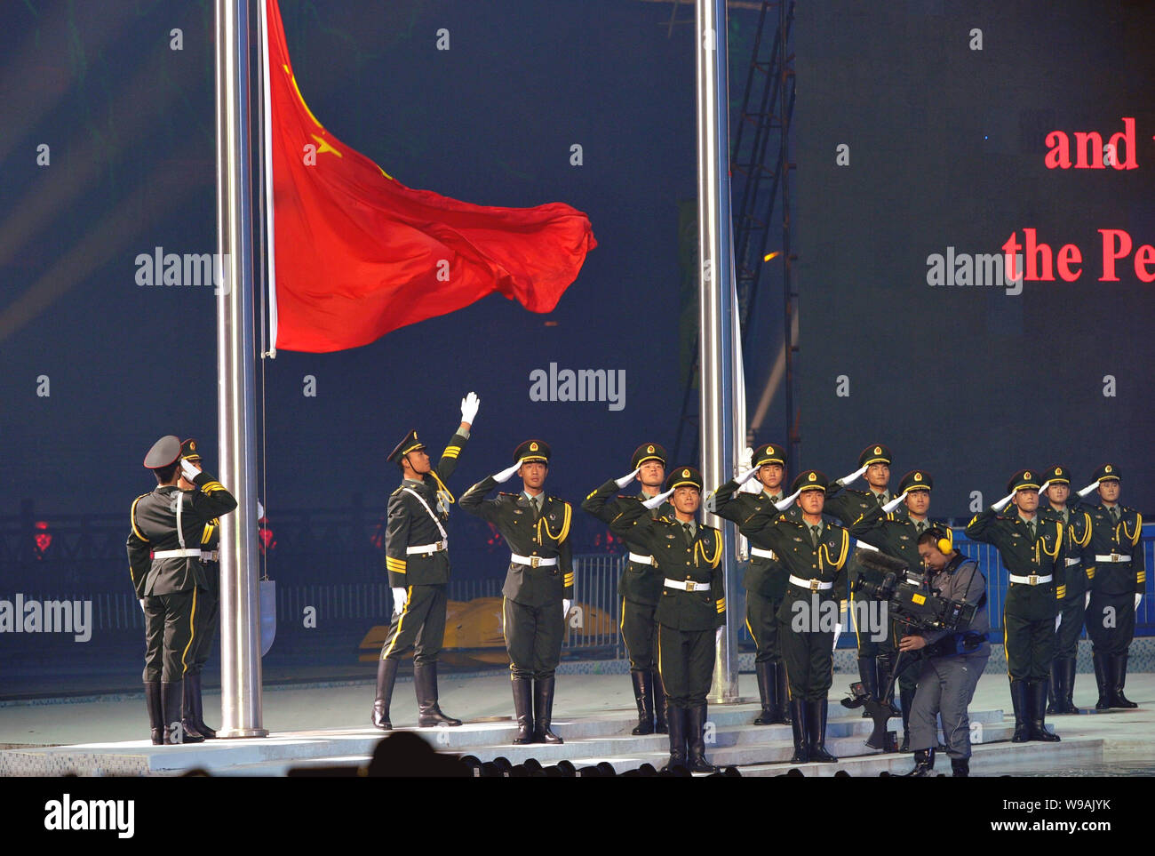 Chinese PLA soldiers raise Chinese national flag during the opening ...