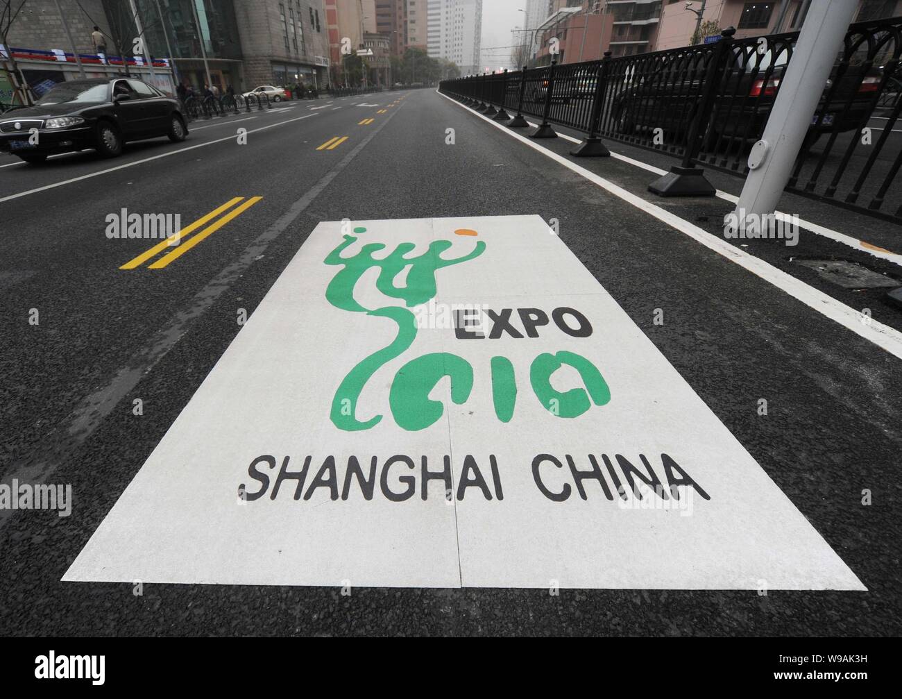 An emblem of Shanghai Expo is seen marked on a lane in Shanghai, China ...