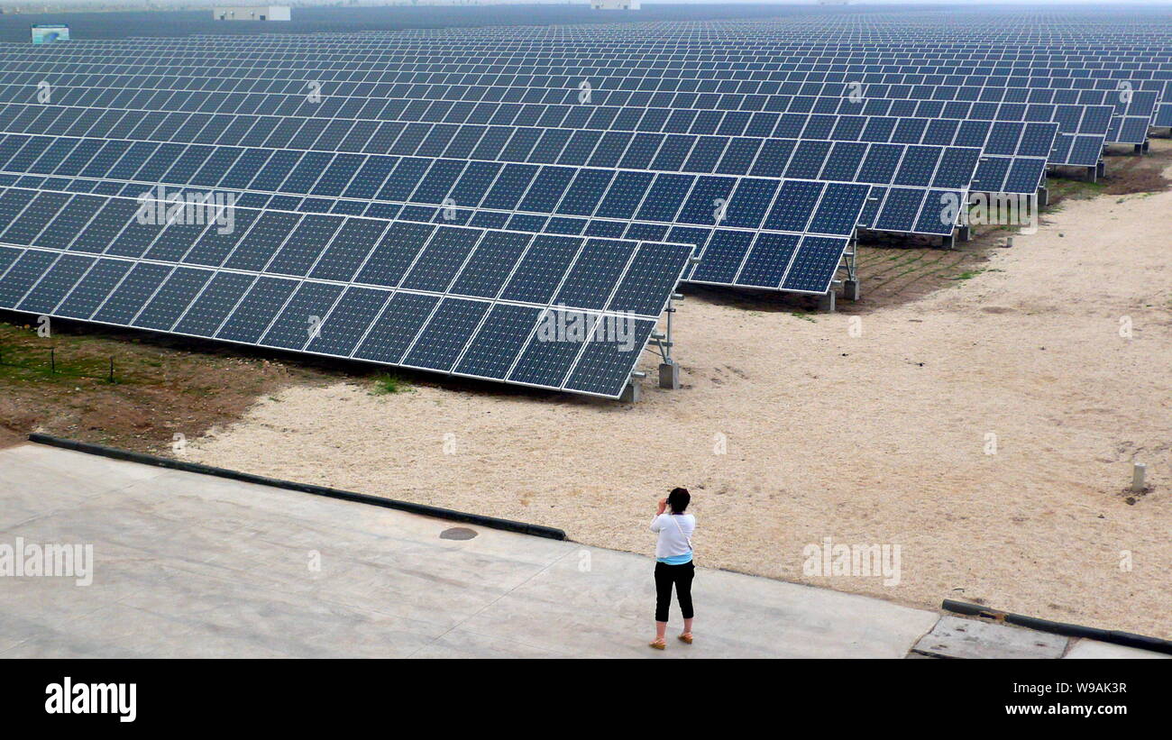 Solar panels are seen at a 10-megawatt (MW) utility-scale solar power ...