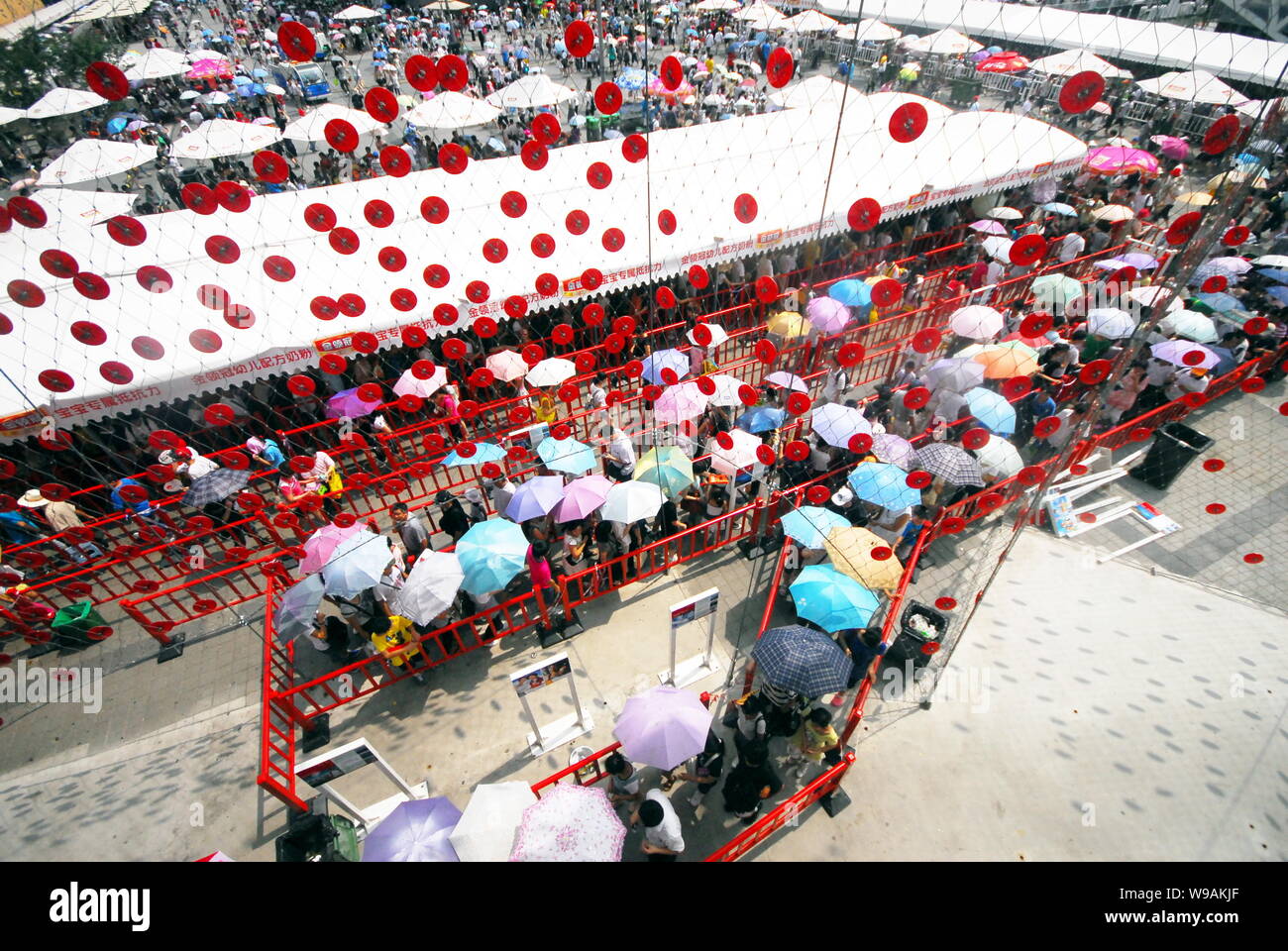 Crowds of visitors queue up to enter the Switzerland Pavilion in the ...