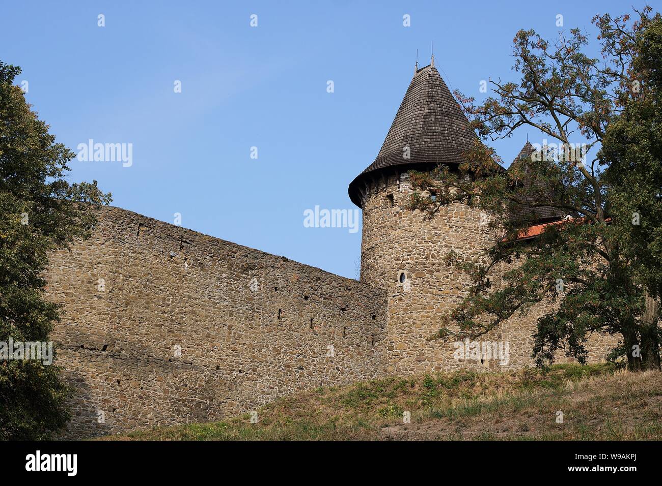 Medieval European stone wall castle. This is castle Helfstyn in central ...