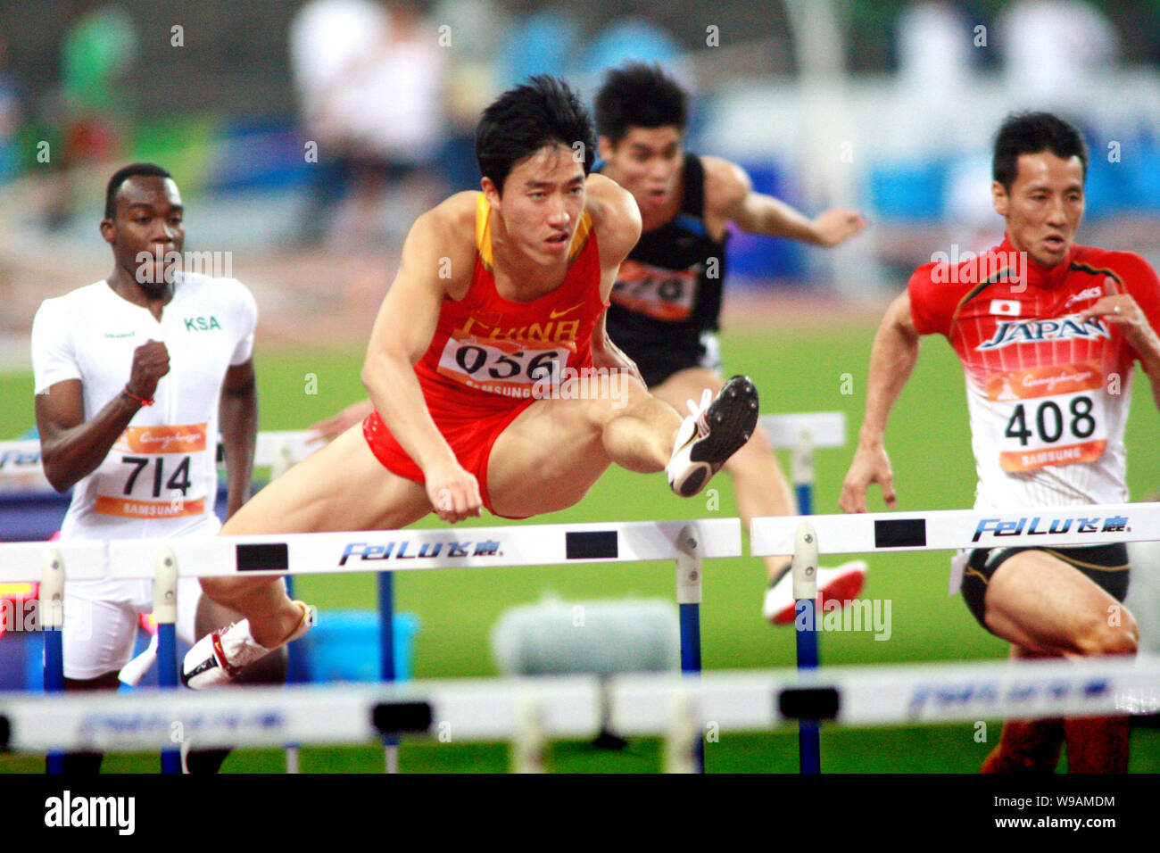 Chinas star hurdler Liu Xiang, front, competes in the mens 110m hurdles ...