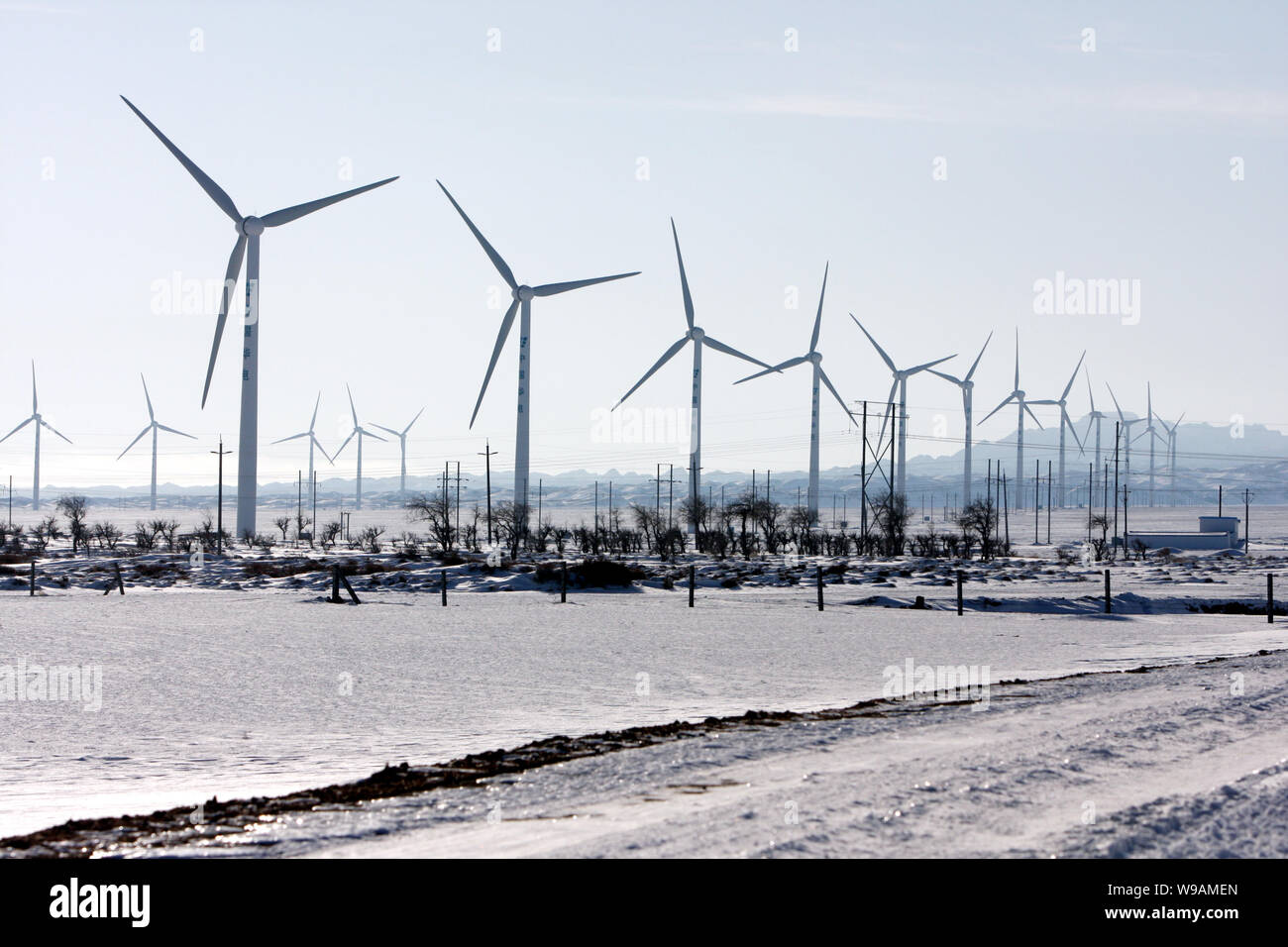 --FILE--Wind turbines generate electricity at a wind farm in Burjin ...