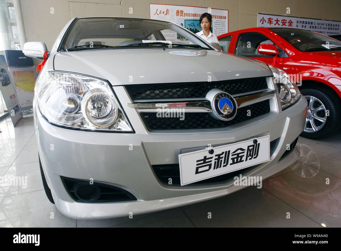 --FILE--Geely cars are displayed at a Geely dealership in Shanghai ...