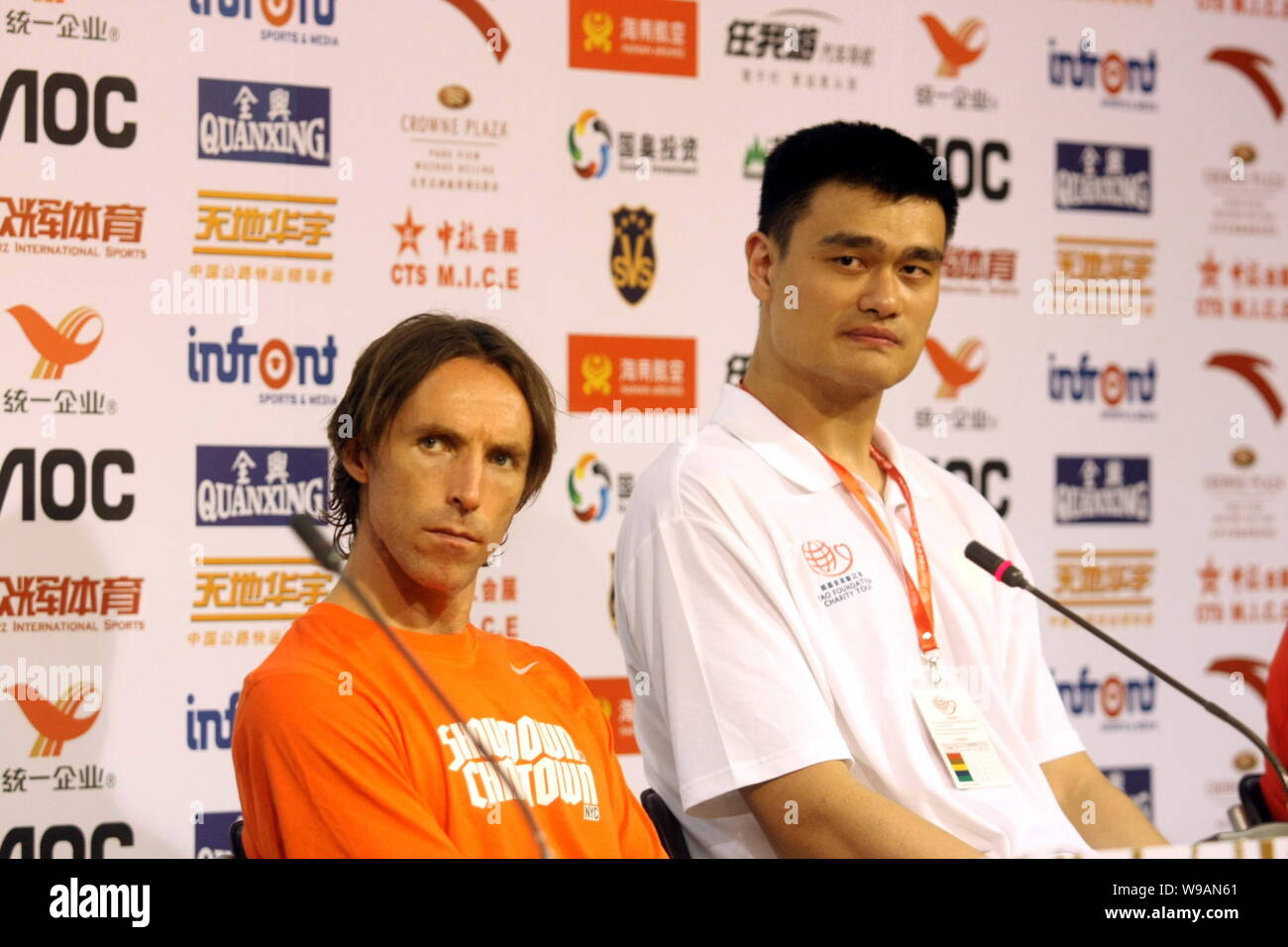 Chinese basketball player Yao Ming of the Houston Rockets, right, and ...