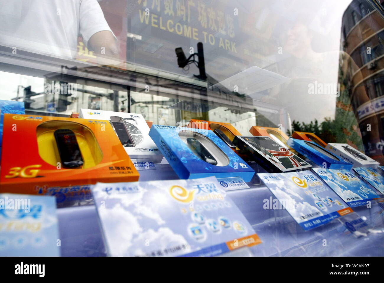 Wireless modems are for sale at a telecommunication products mall in ...