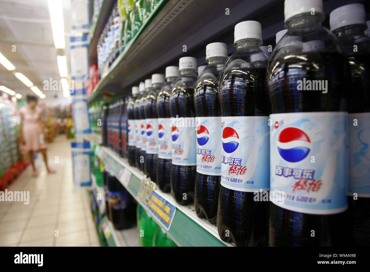 Bottles of Pepsi Cola are seen for sale at a supermarket in Shanghai ...