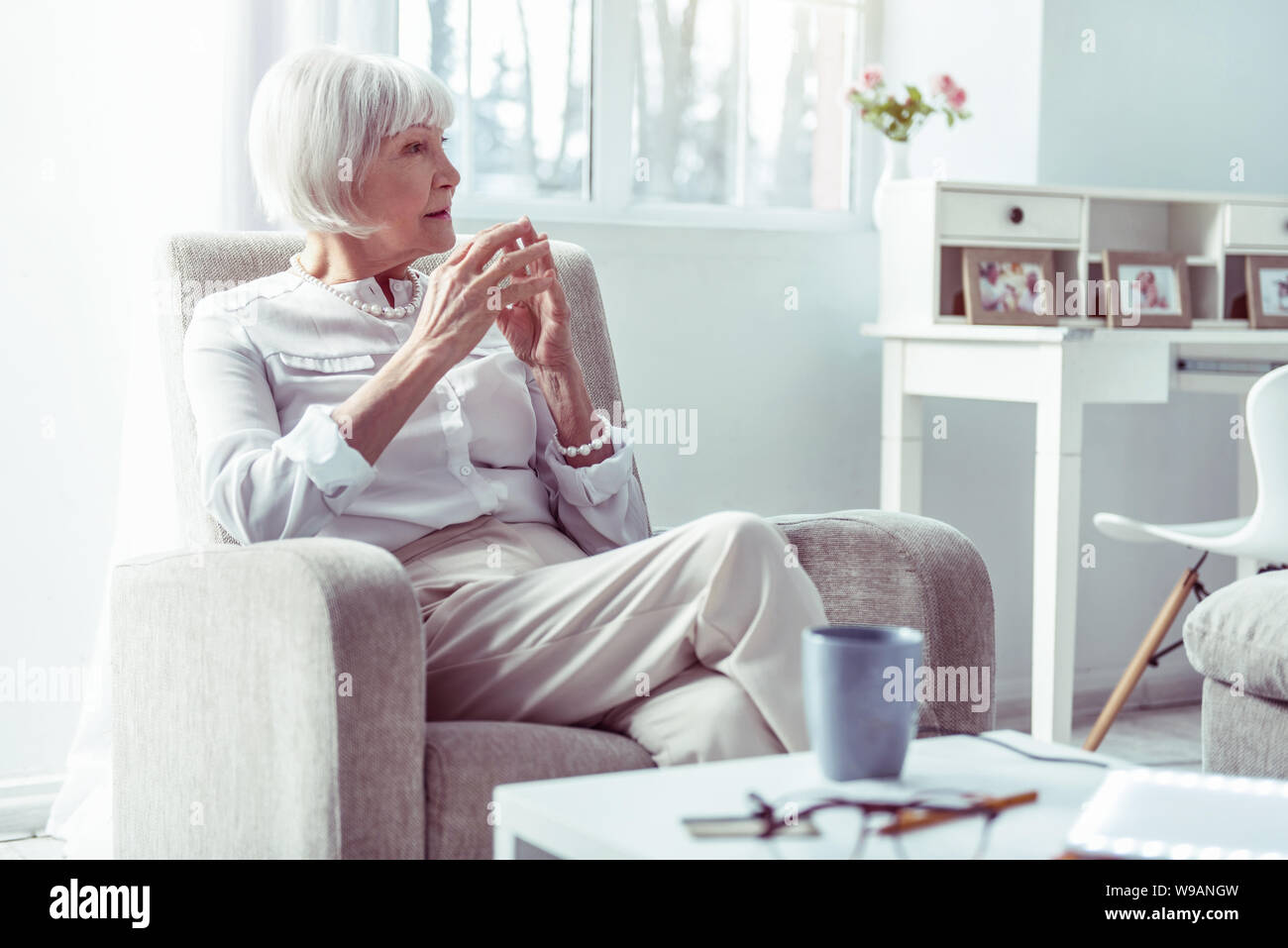 Beautiful mature woman waiting beauty hi-res stock photography and ...