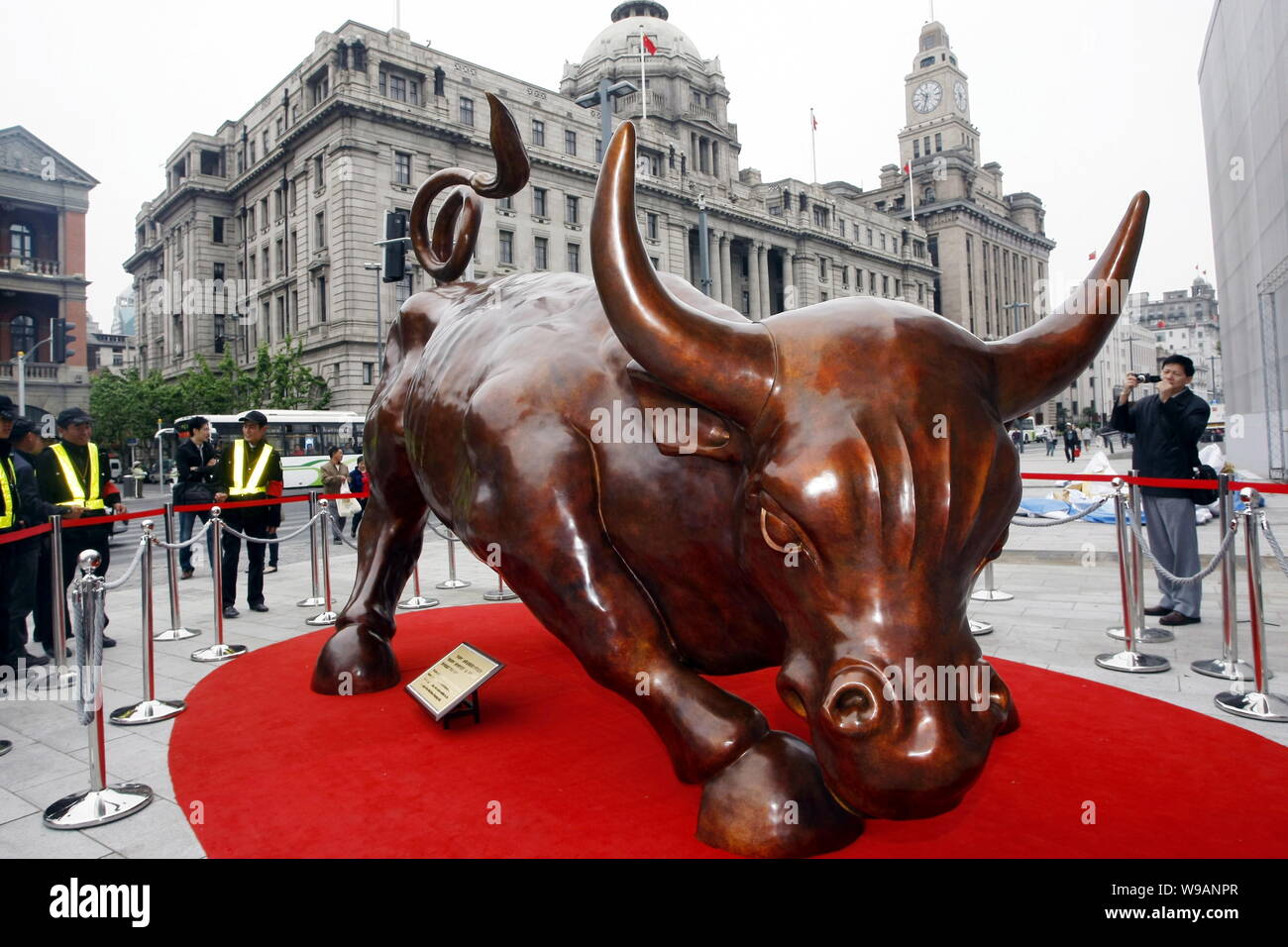 The bronze Bund Bull statue, designed by Italian-American artist Arturo ...