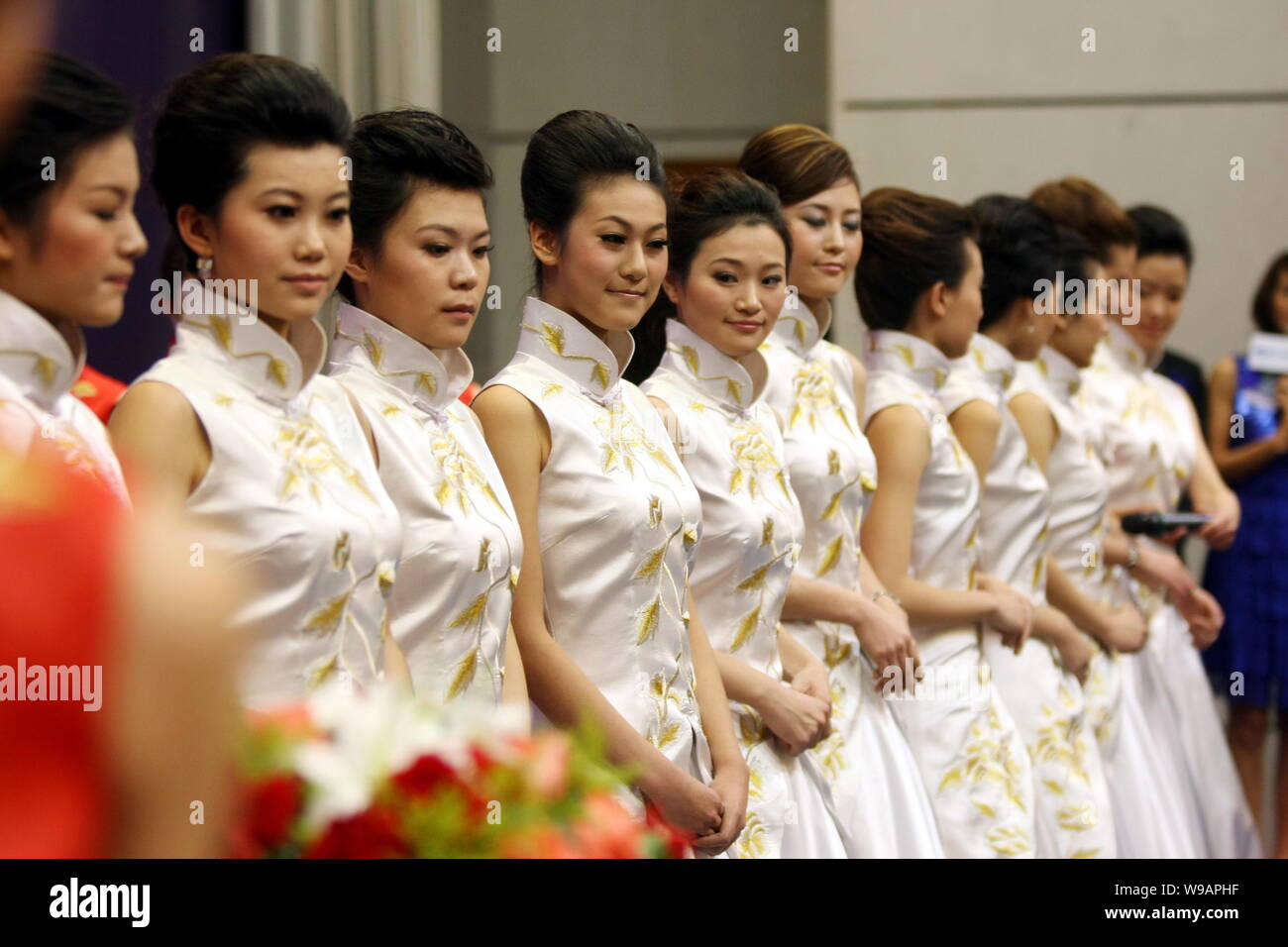 Candidates pose during a contest to select the Miss Etiquette for ...