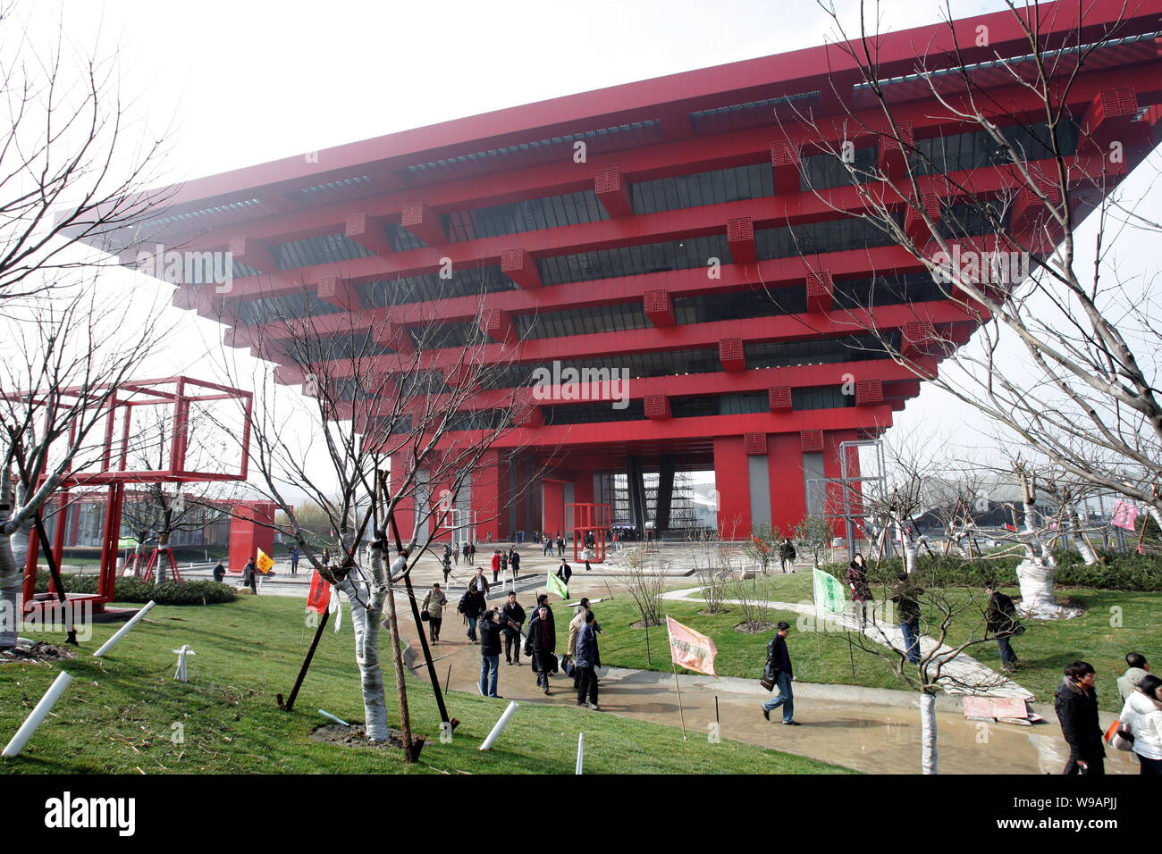 Visitors leave the China Pavilion in the Expo site in Shanghai, China ...