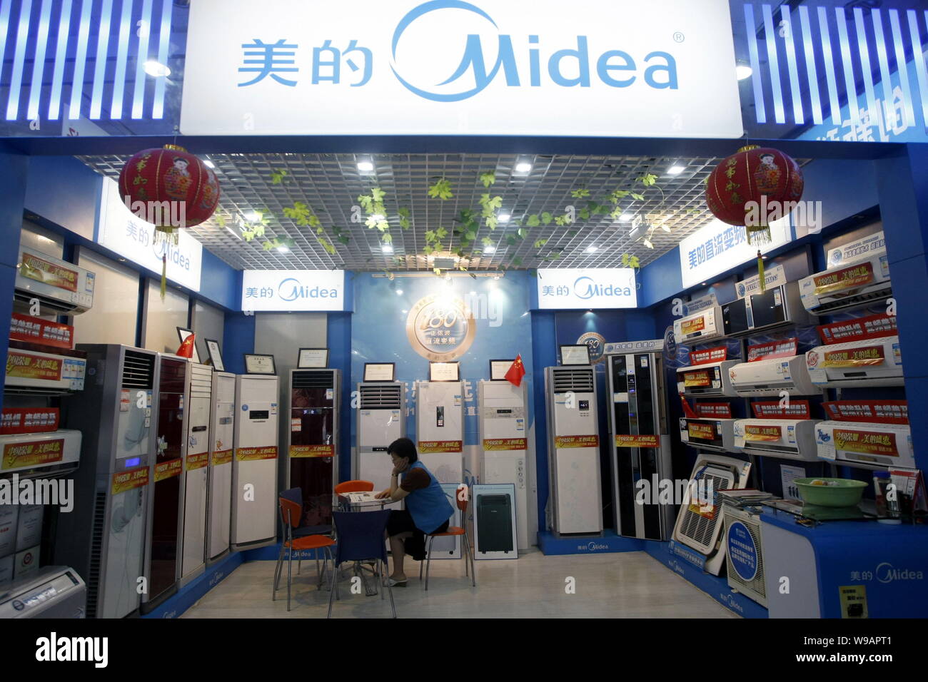 --FILE--Midea air-conditioners are seen for sale at a home appliances ...