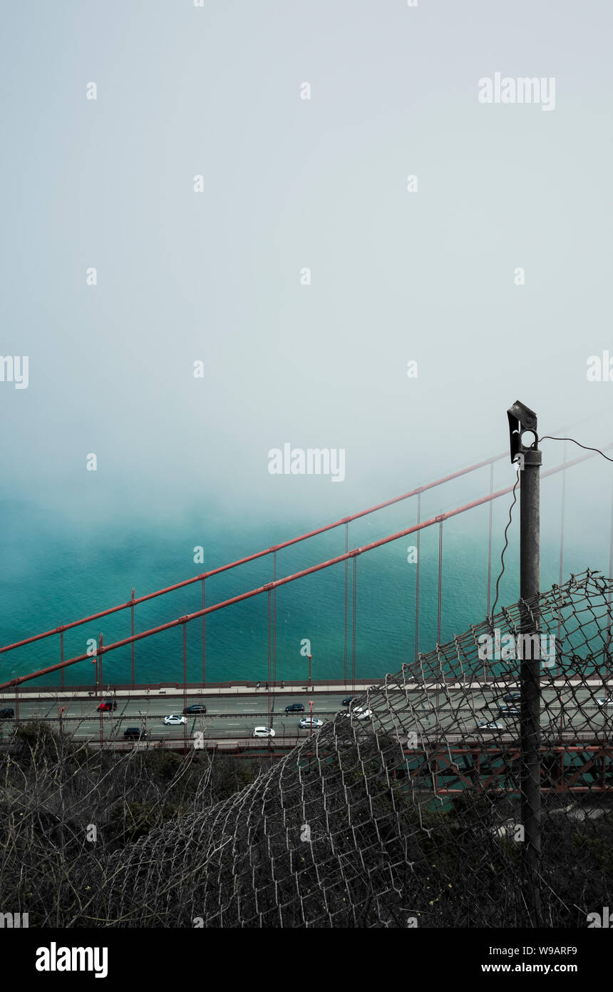 Golden Gate Bridge covered by fog Stock Photo - Alamy