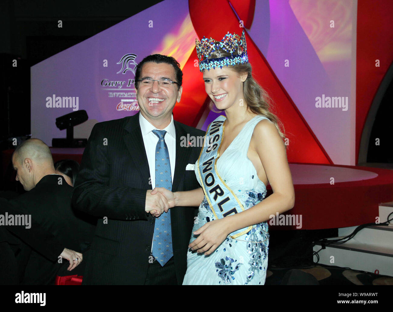 Alexandria Mills, right, winner of the Miss World 2010 pageant, is seen ...