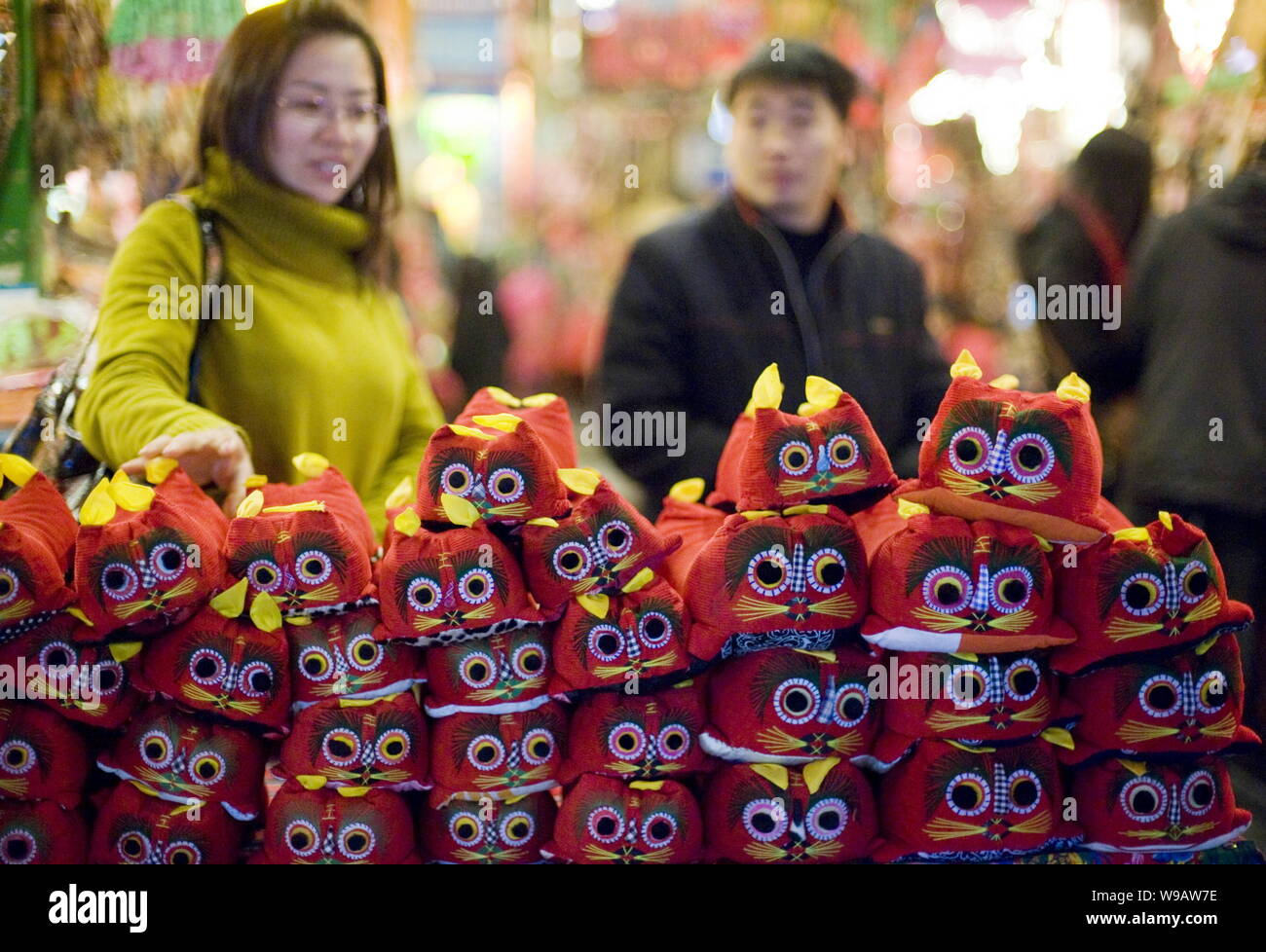 Local residents shop for tiger-shaped decorations for the upcoming ...