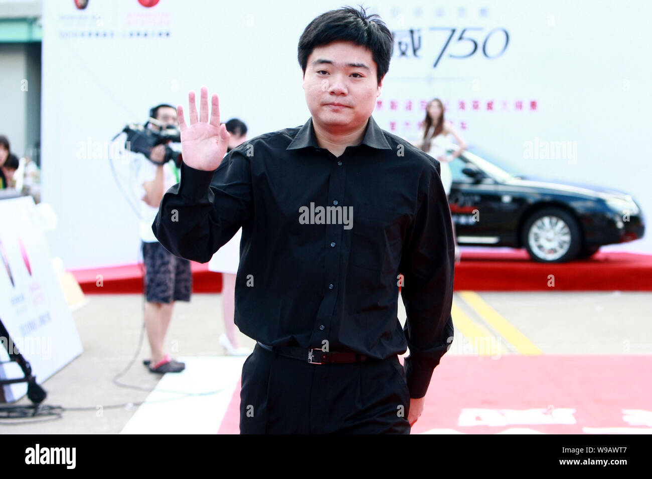 Chinese snooker player Ding Junhui arrives at the red carpet ceremony ...