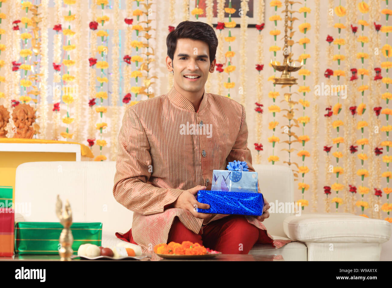 Young man celebrating Diwali Stock Photo - Alamy