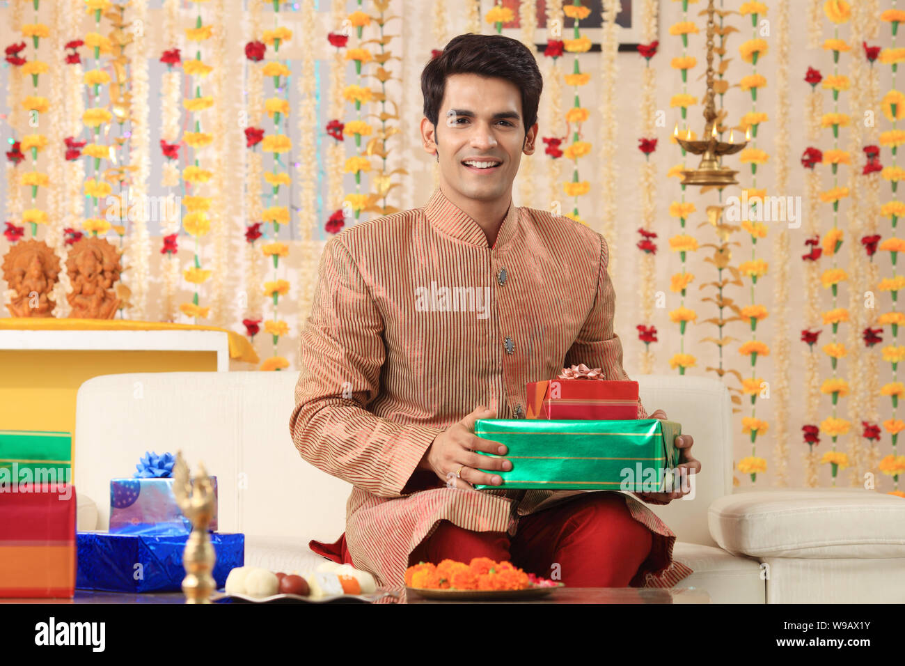 Young man celebrating Diwali Stock Photo - Alamy