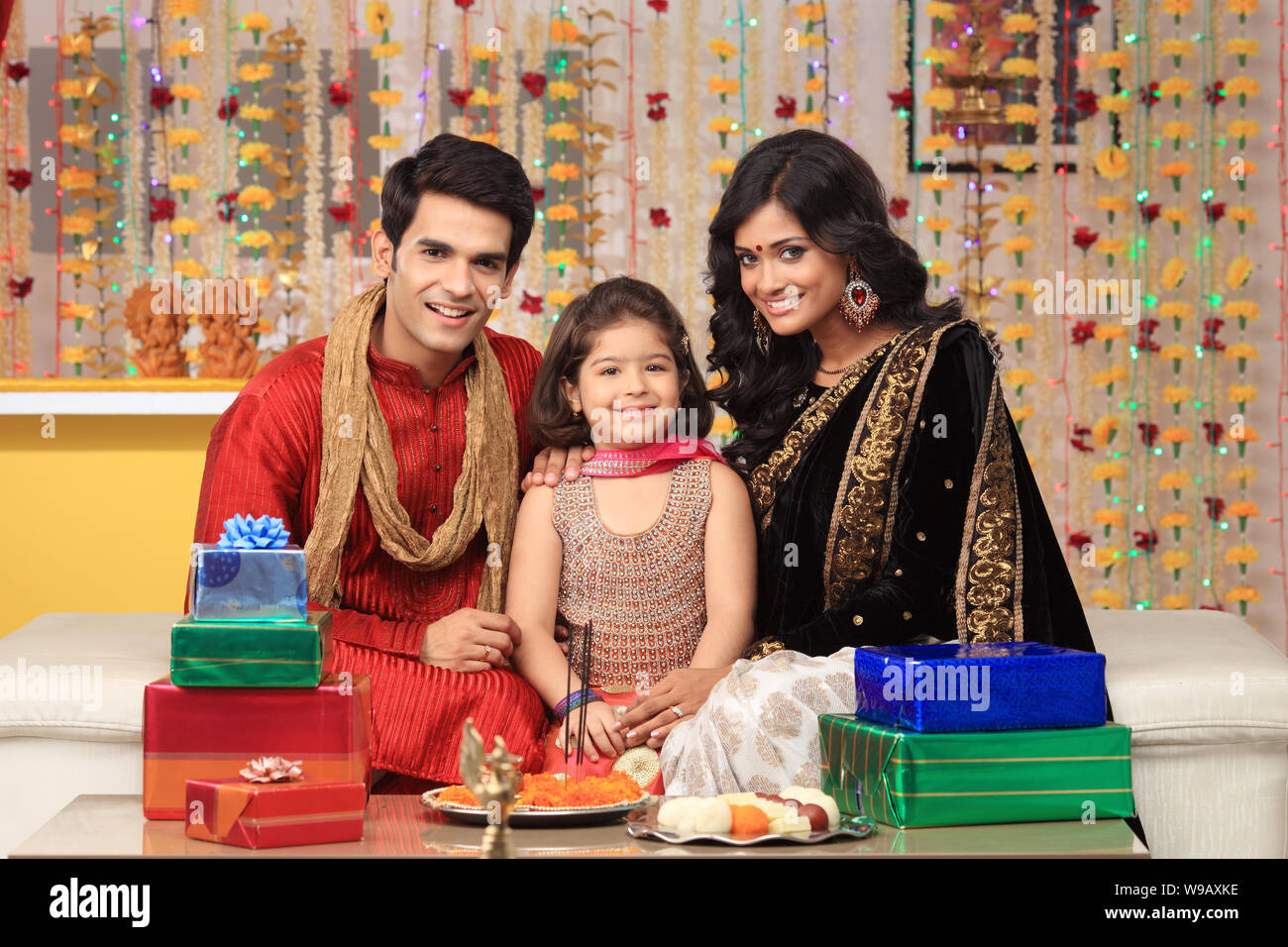 Family celebrating Diwali Stock Photo - Alamy