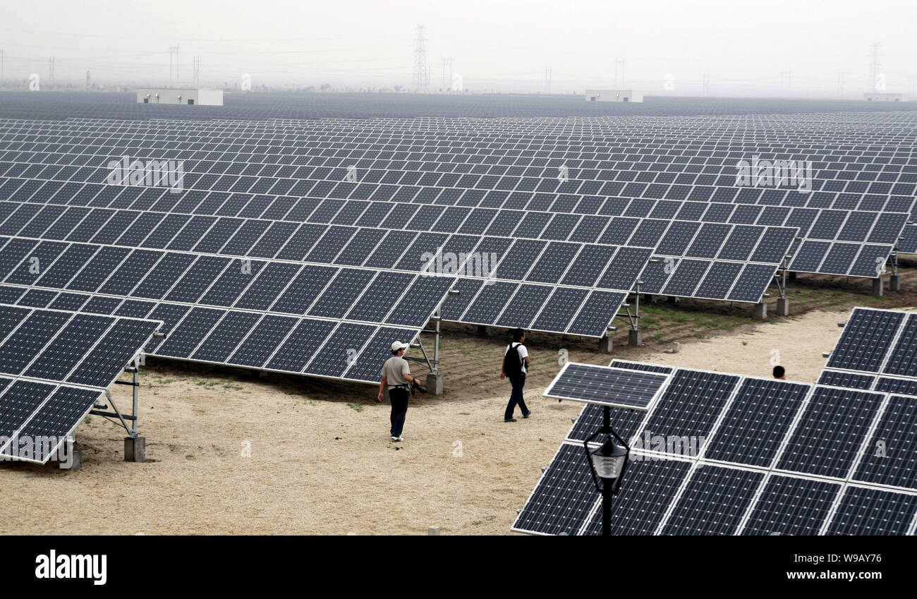 Solar panels are seen at a 10-megawatt (MW) utility-scale solar power ...