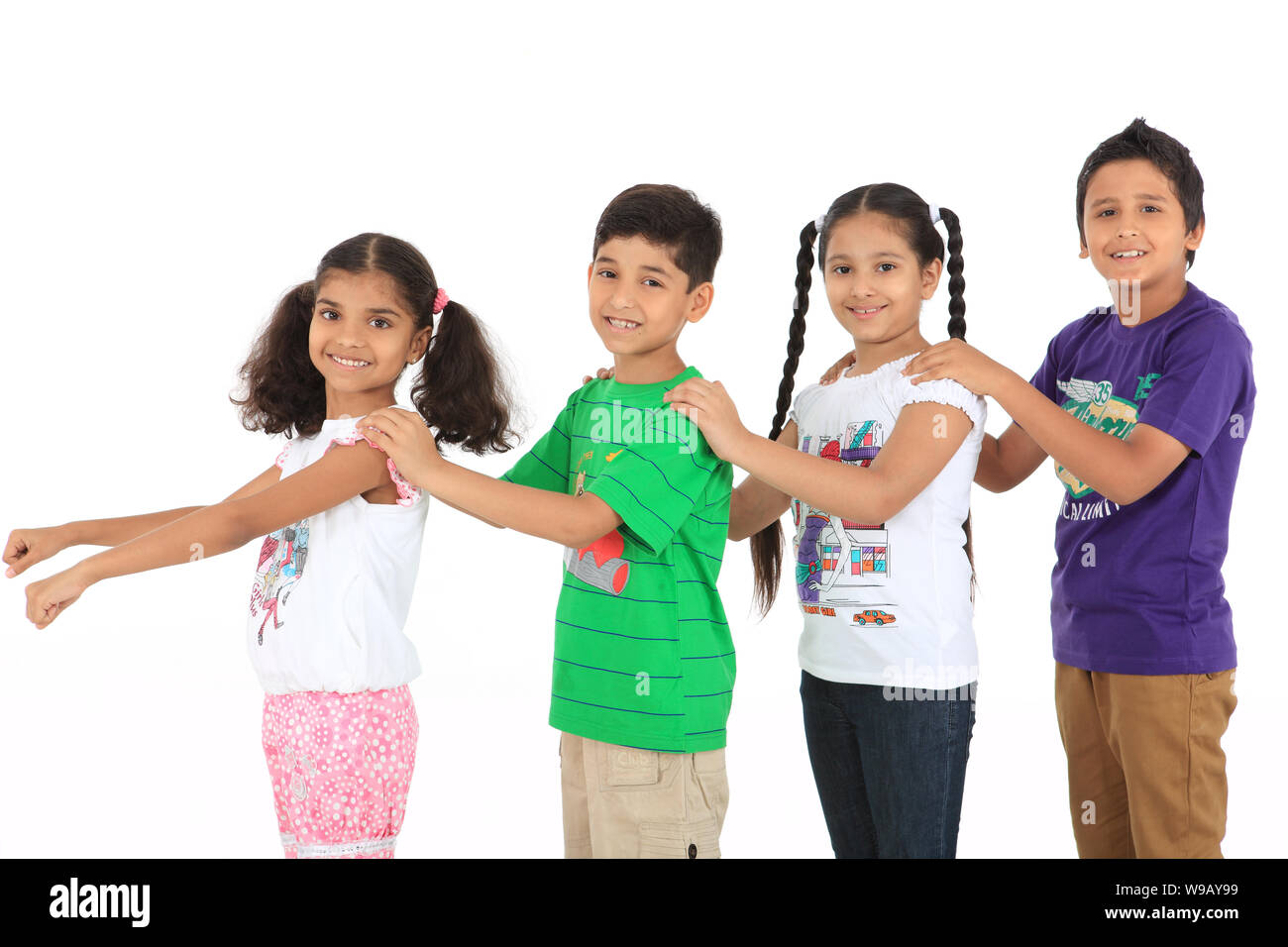 Group of children playing in a row Stock Photo - Alamy
