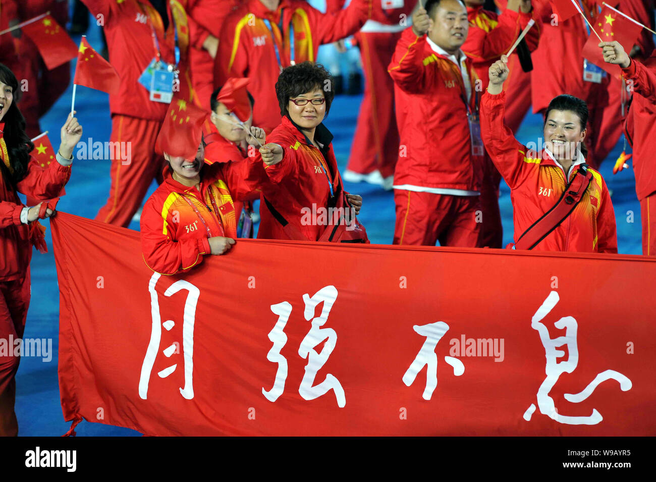 Chinese delegates attend the opening ceremony of the Guangzhou 2010 ...