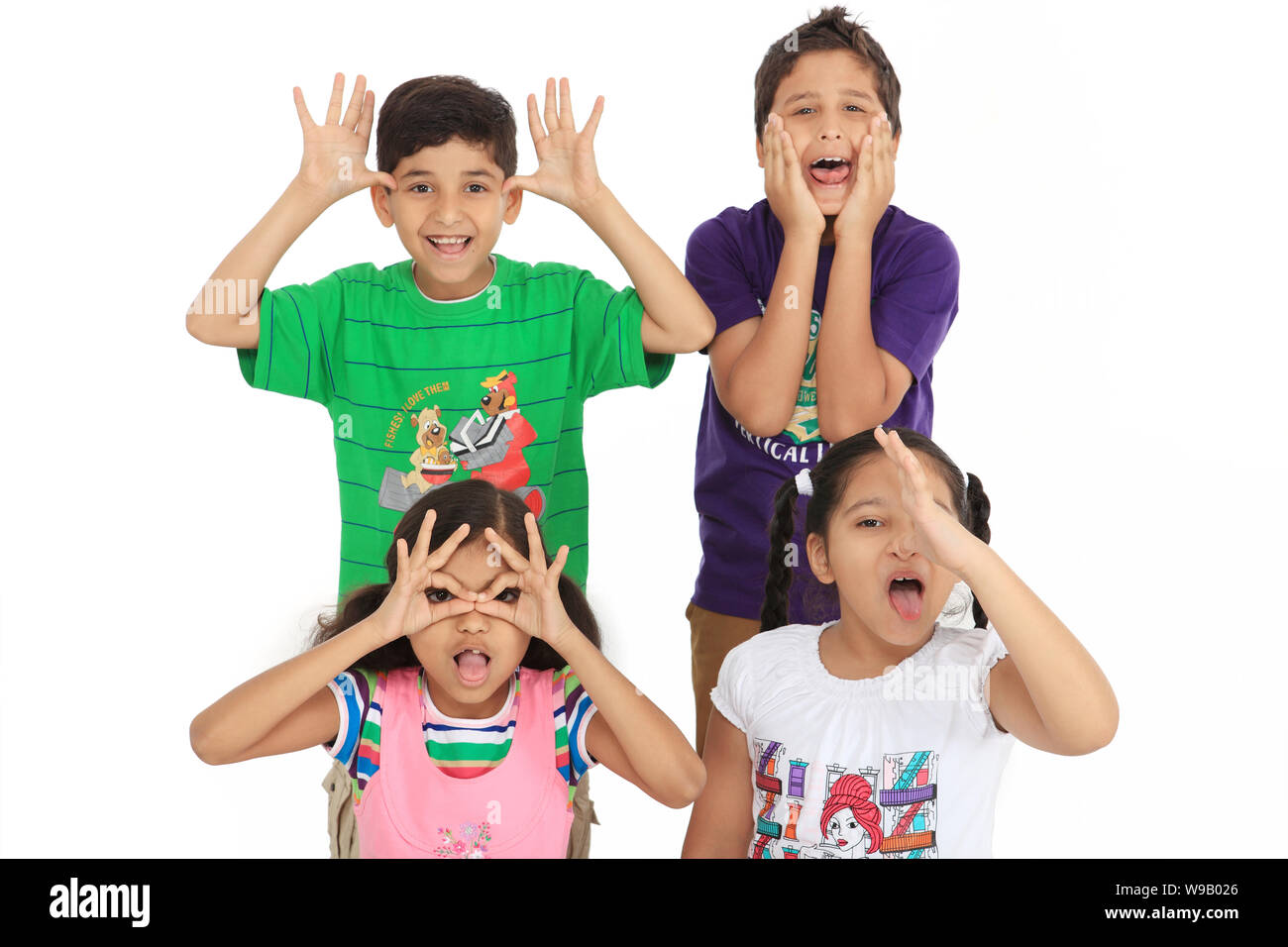 Group of children teasing Stock Photo - Alamy