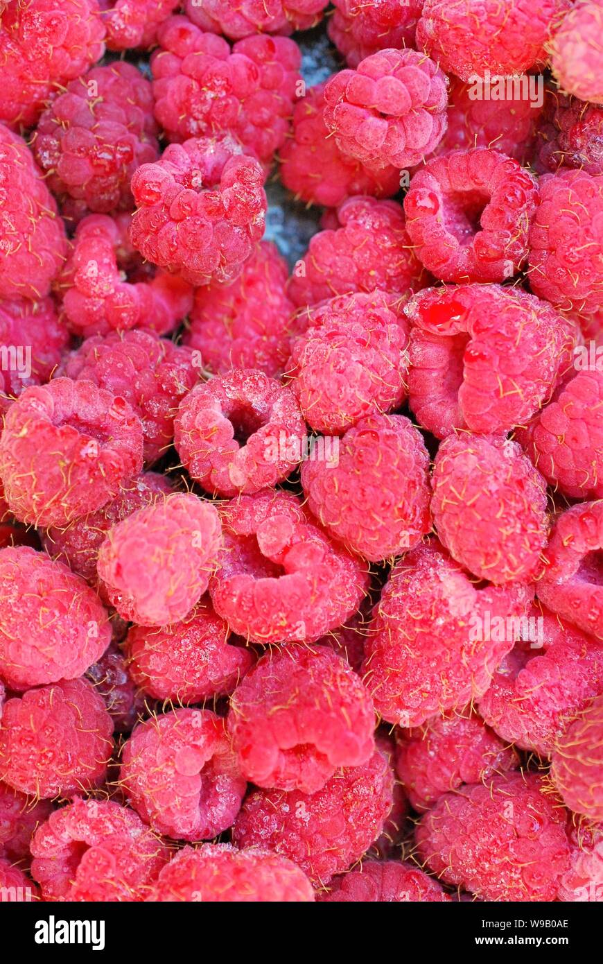 Raspberry fruit close up image of a Stock Photo - Alamy