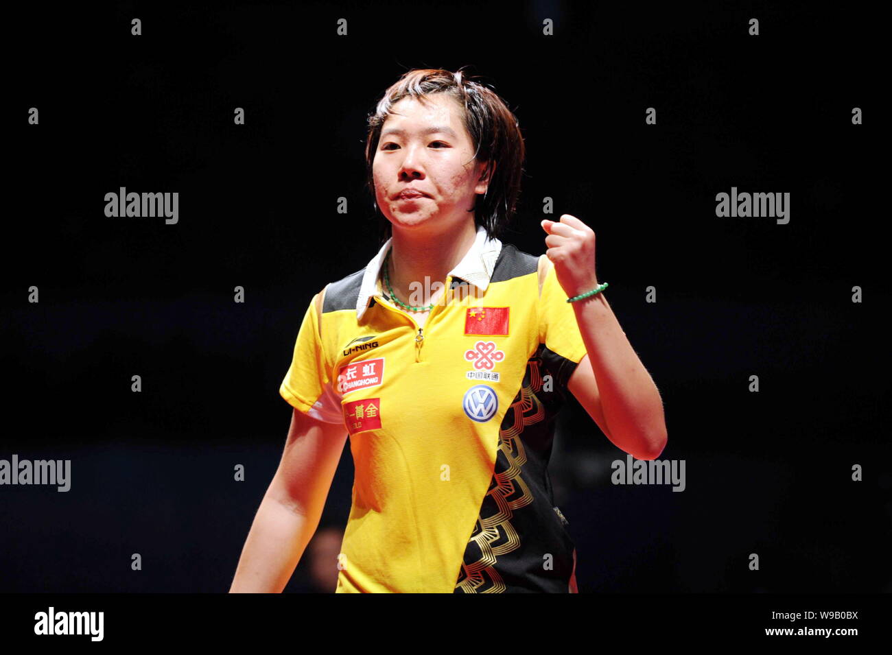 Chinas Li Xiaoxia celebrates after scoring against Kim Kyung-ah of ...
