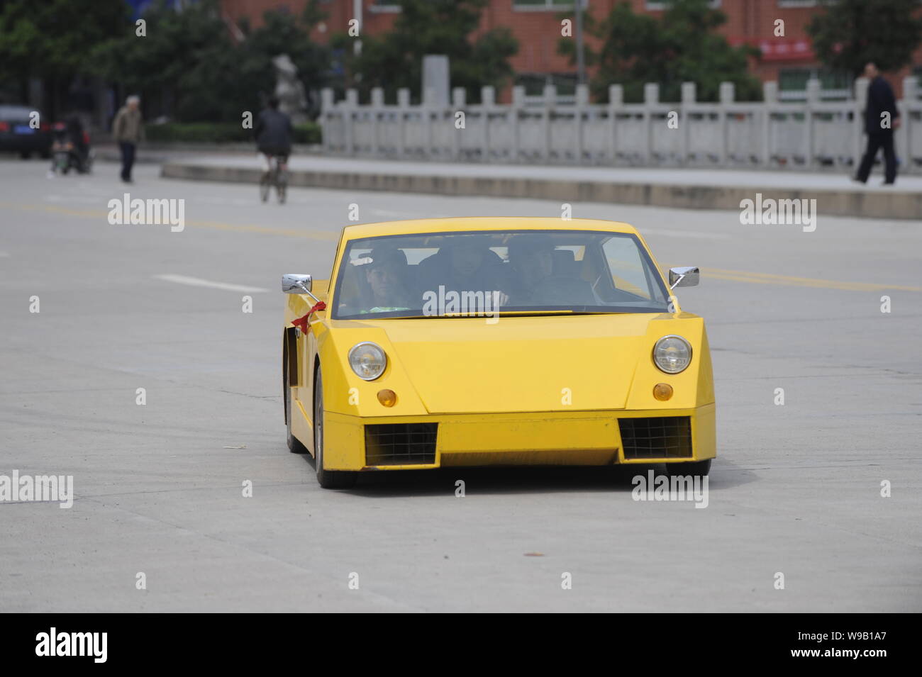 A knockoff Lamborghini is seen running on a street in Chenzhou, central ...