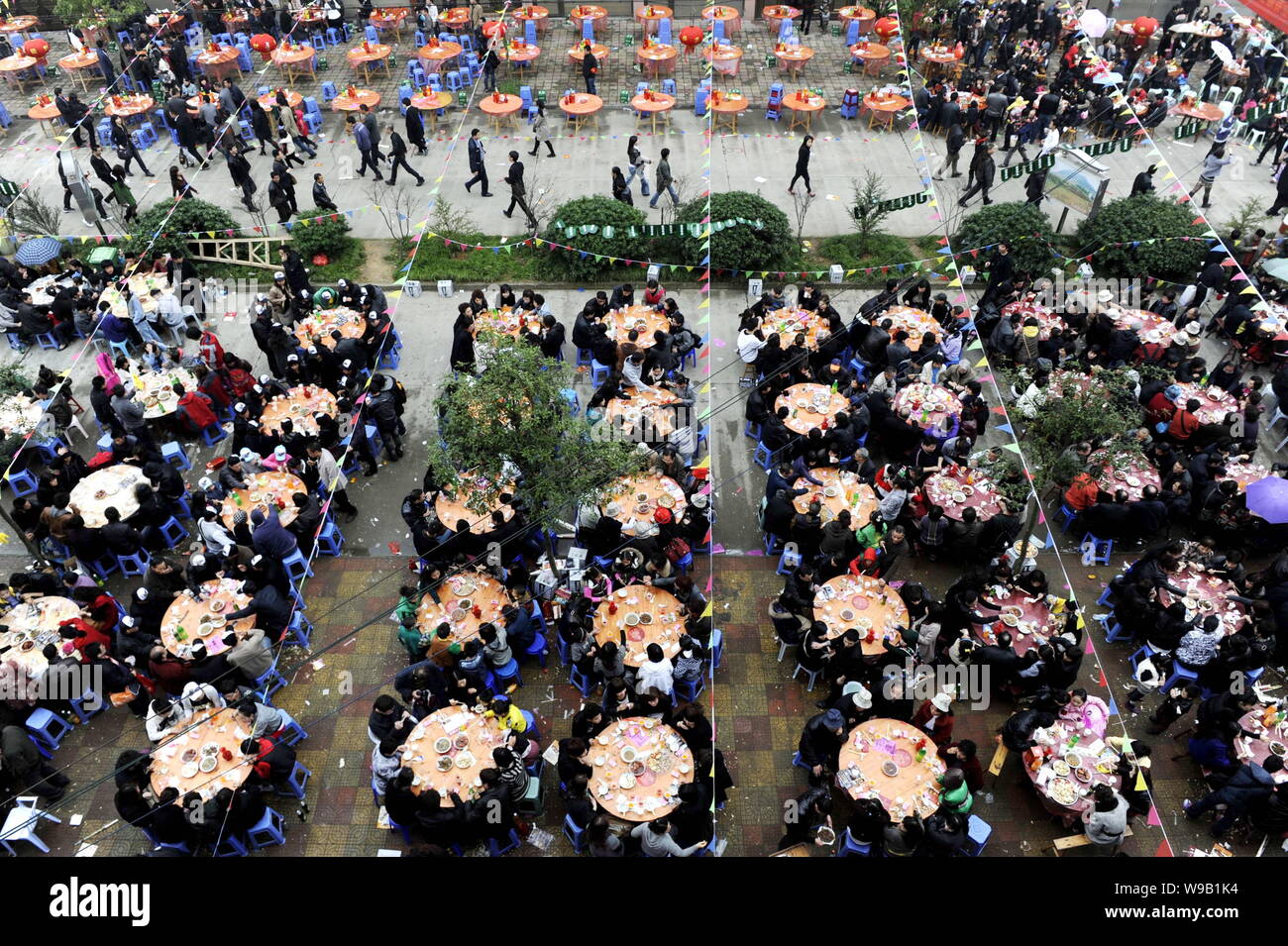 Thousands of Chinese eat food during a mass outdoor lunch celebrating ...
