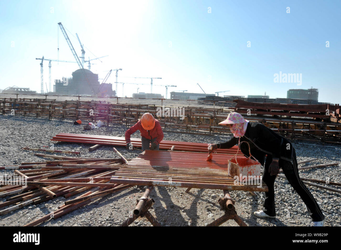 --FILE--Chinese workers labor on the construction site of the Fuqing ...